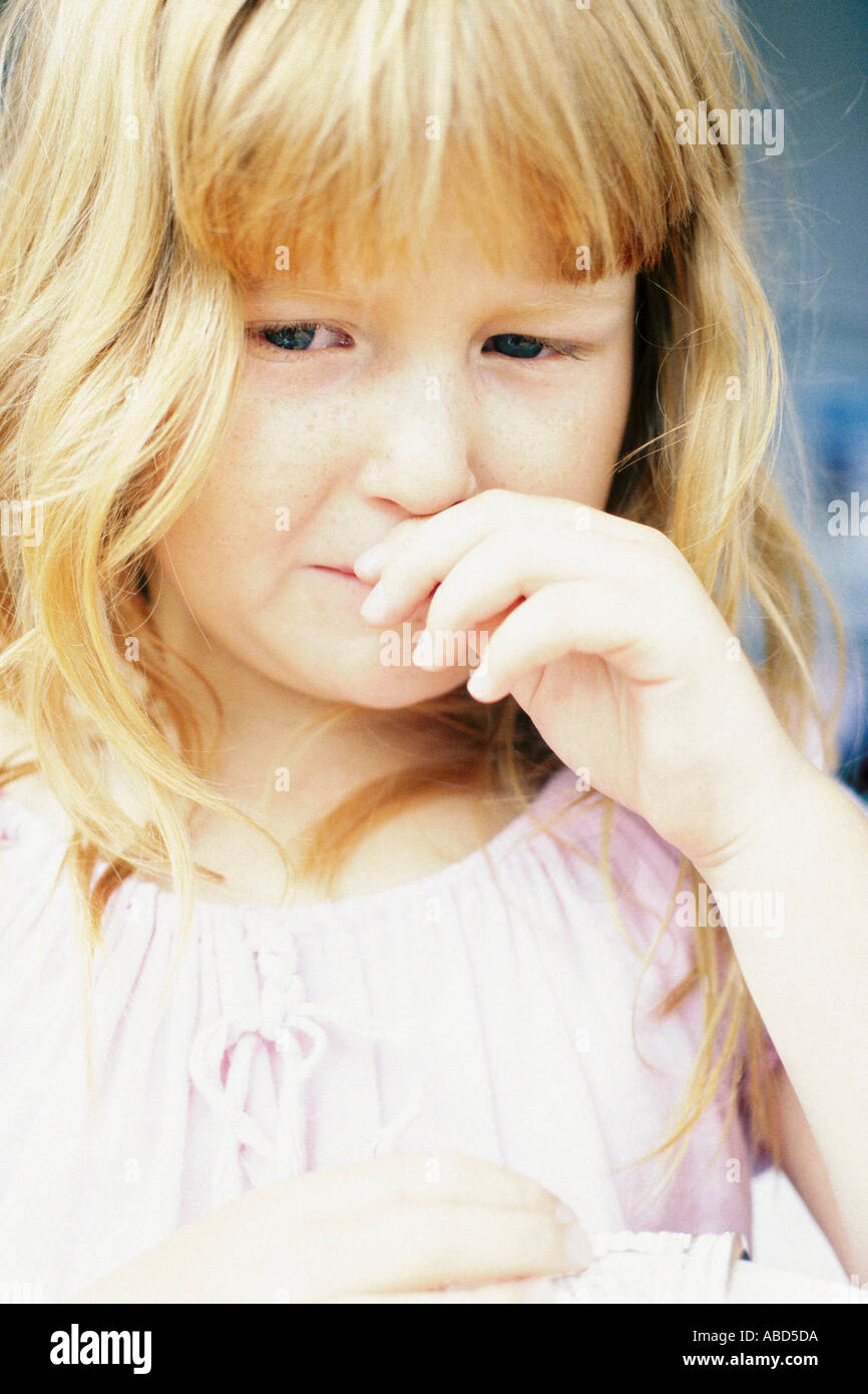 Girl point at nose hi-res stock photography and images - Alamy