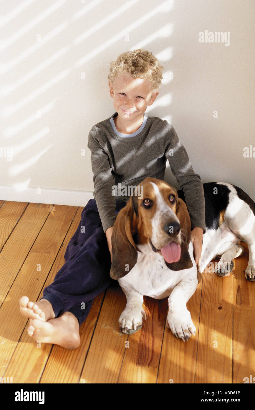 Boy with dog Stock Photo - Alamy