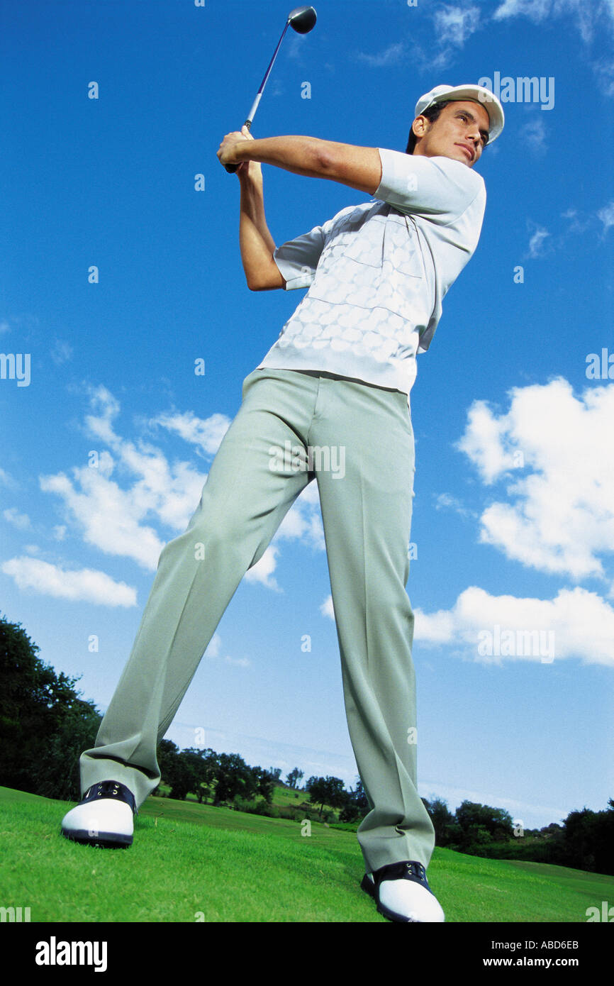 Man playing golf Stock Photo - Alamy
