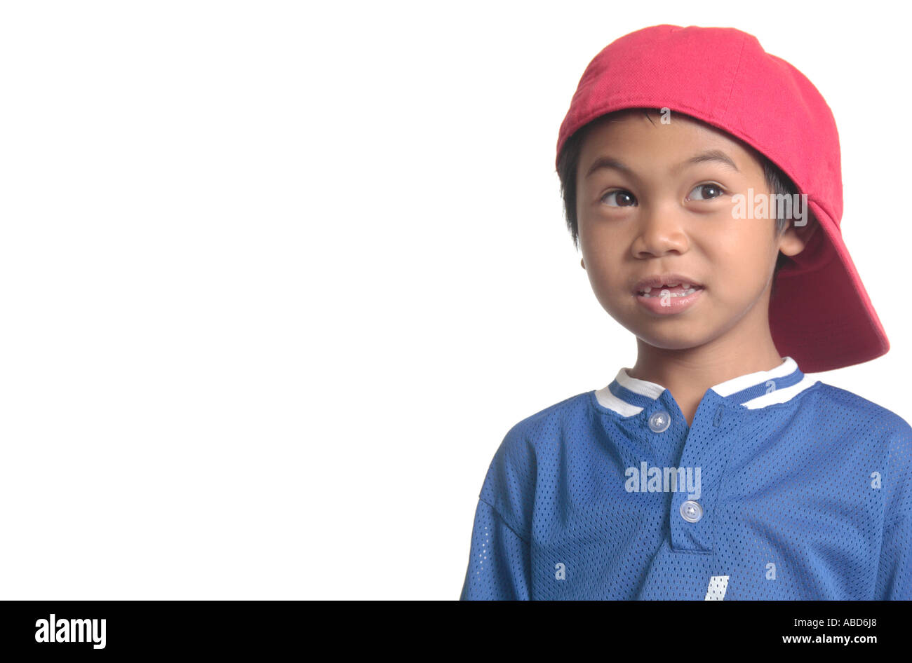 Cute young boy in red baseball cap Stock Photo - Alamy