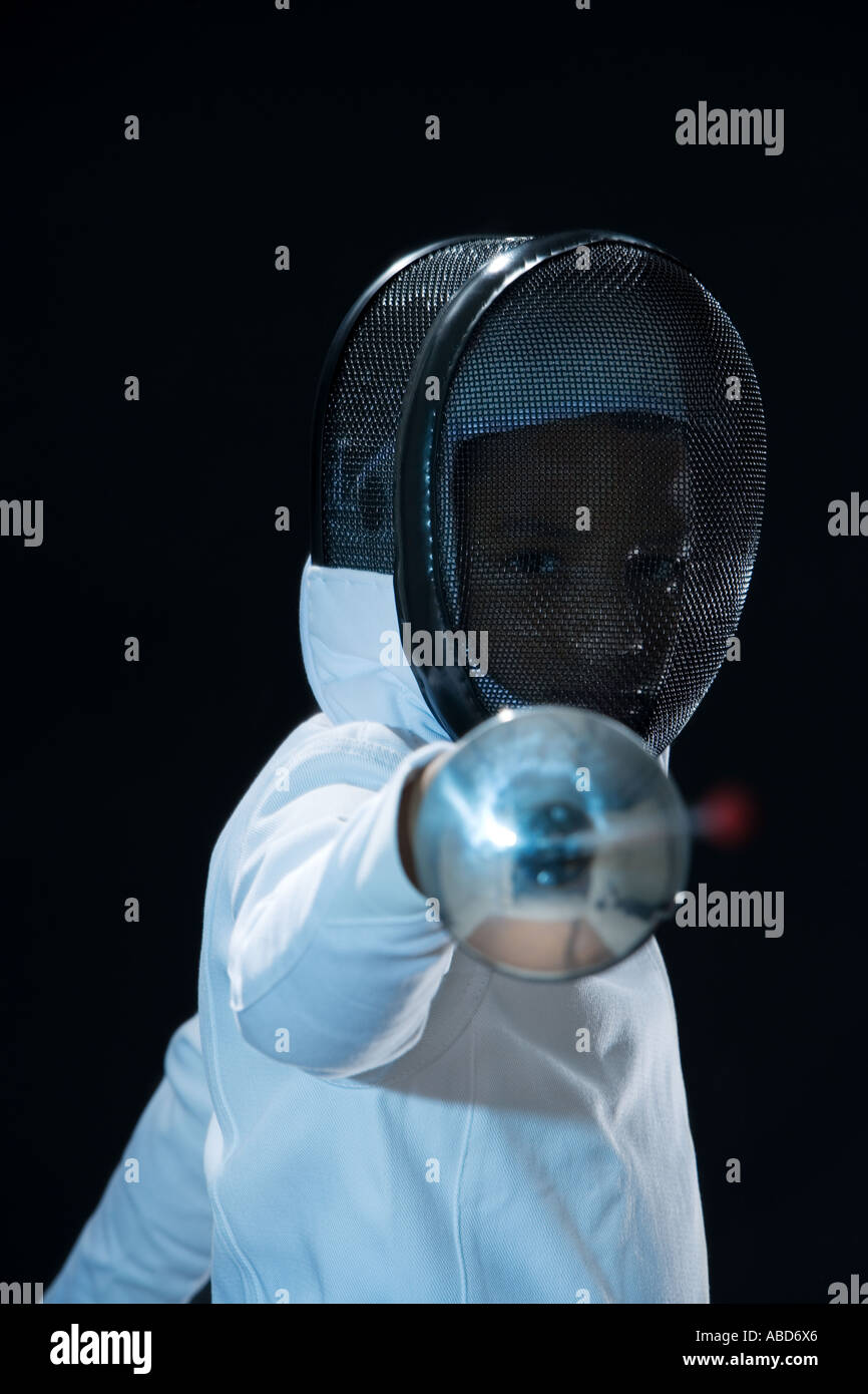 Male fencer holding fencing foil hi-res stock photography and images ...