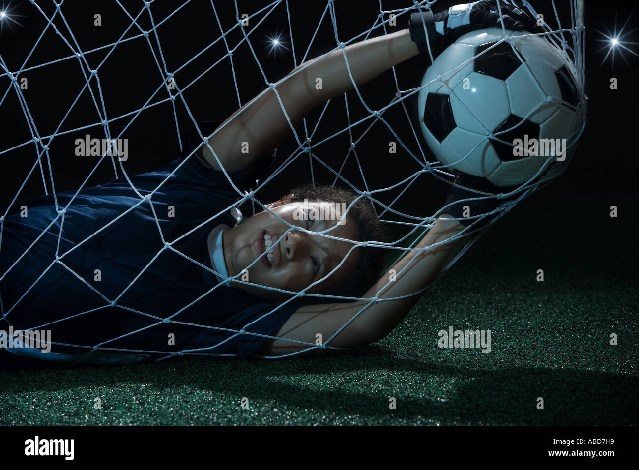 Boy in goal Stock Photo - Alamy