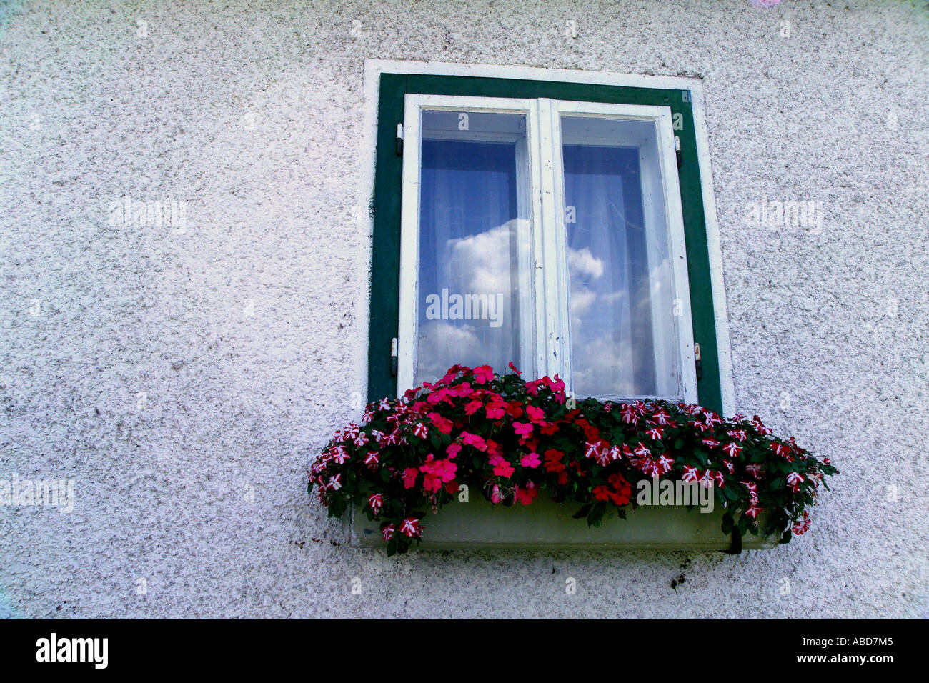 Clouds are reflected in a window Stock Photo - Alamy