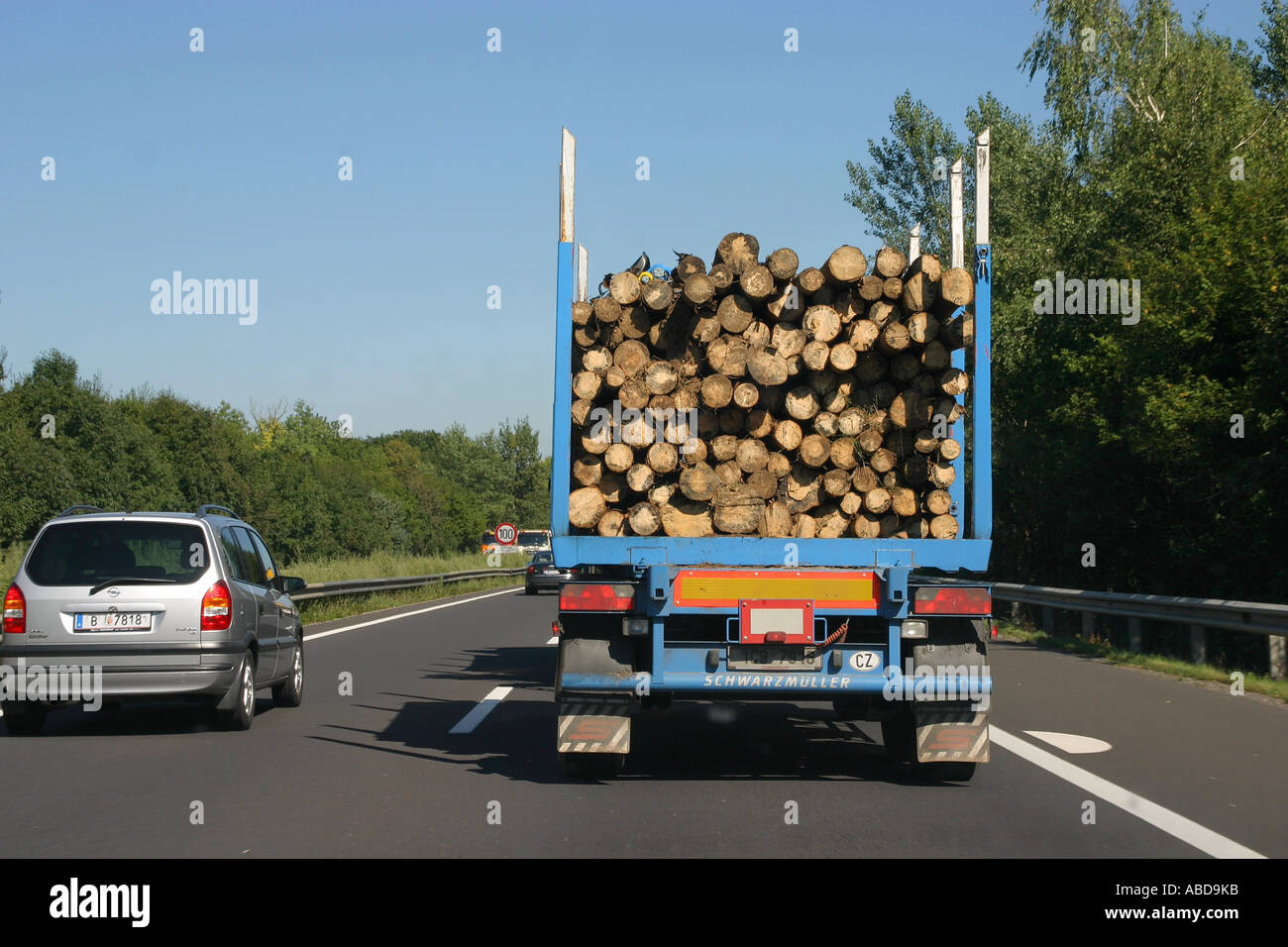 wood transporter on a motorway Stock Photo - Alamy