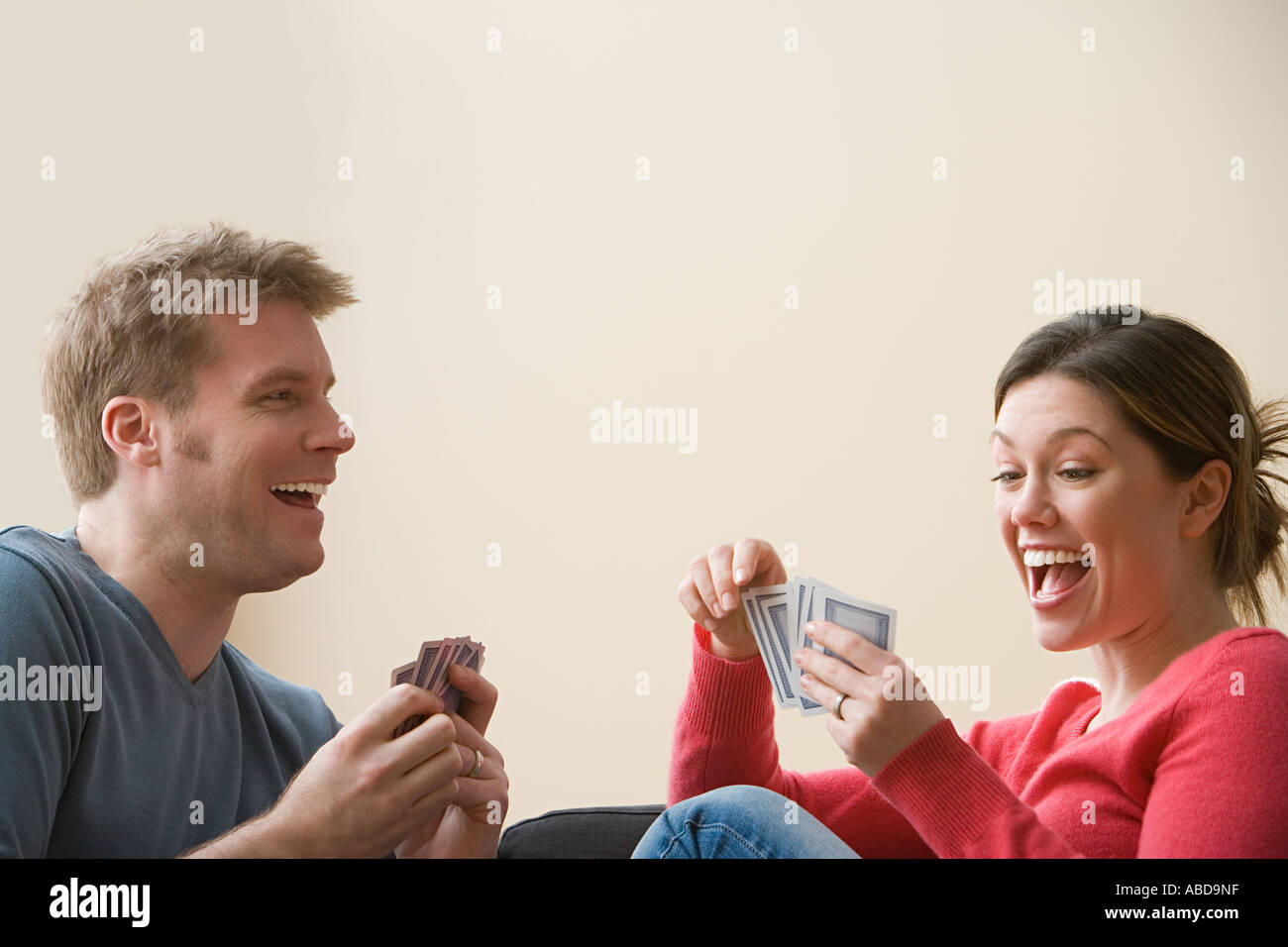 Couple playing cards Stock Photo - Alamy