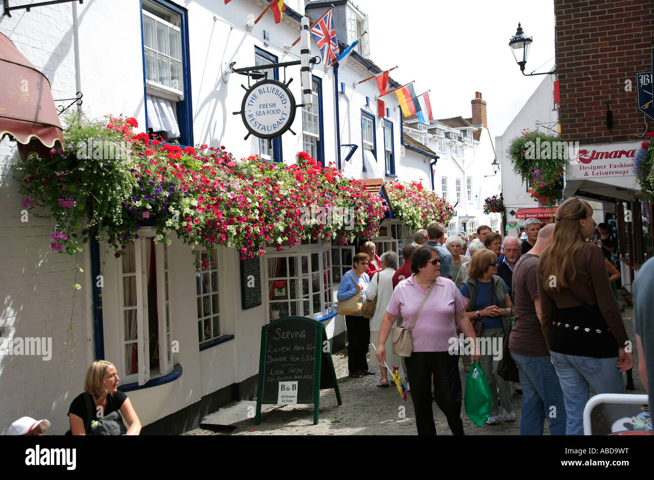 People shopping in Quay Hill Lymington town Hampshire England Britain ...