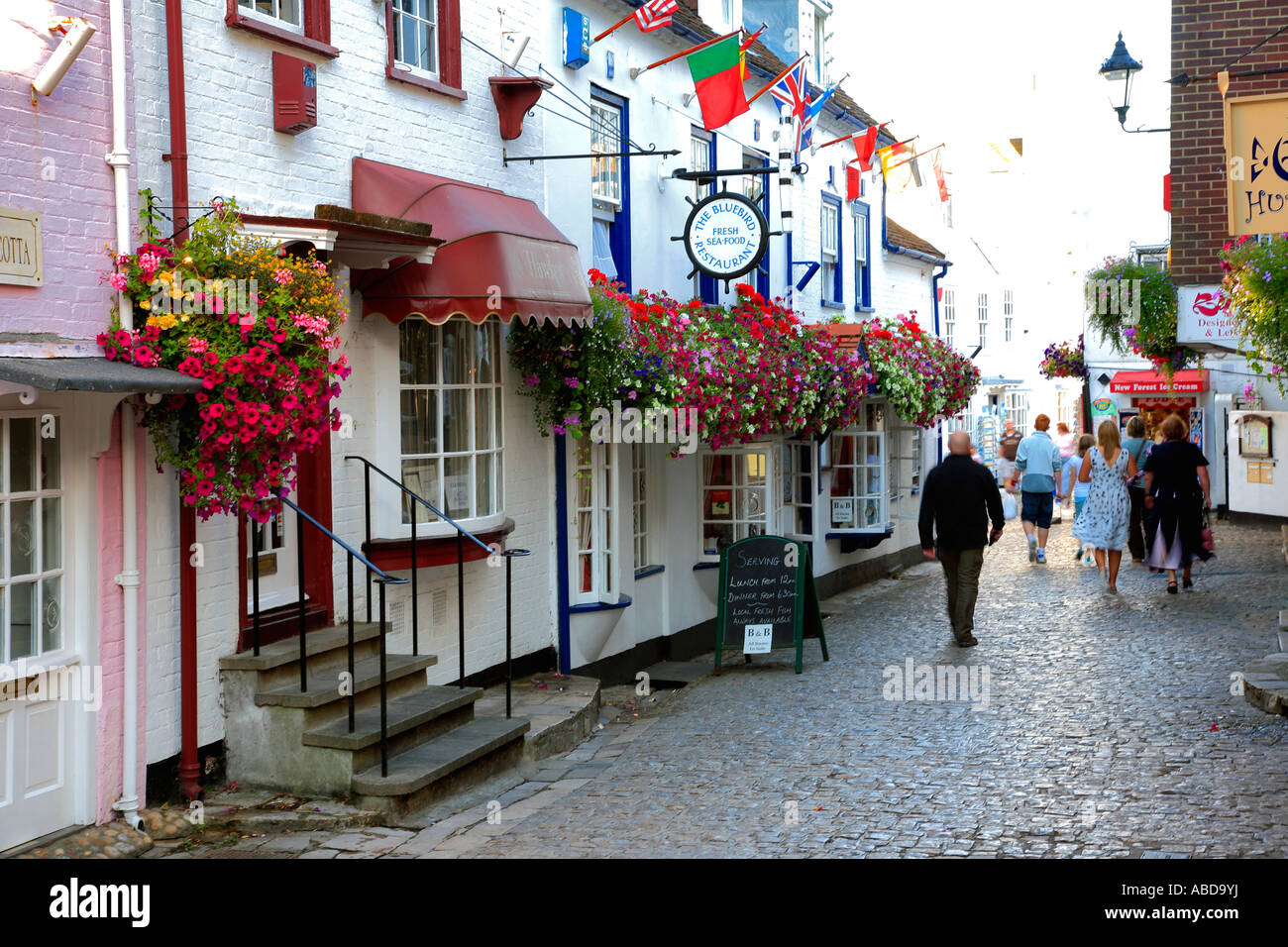 Cobbled street and shops on Quay hill, Lymington Harbour, Hampshire ...