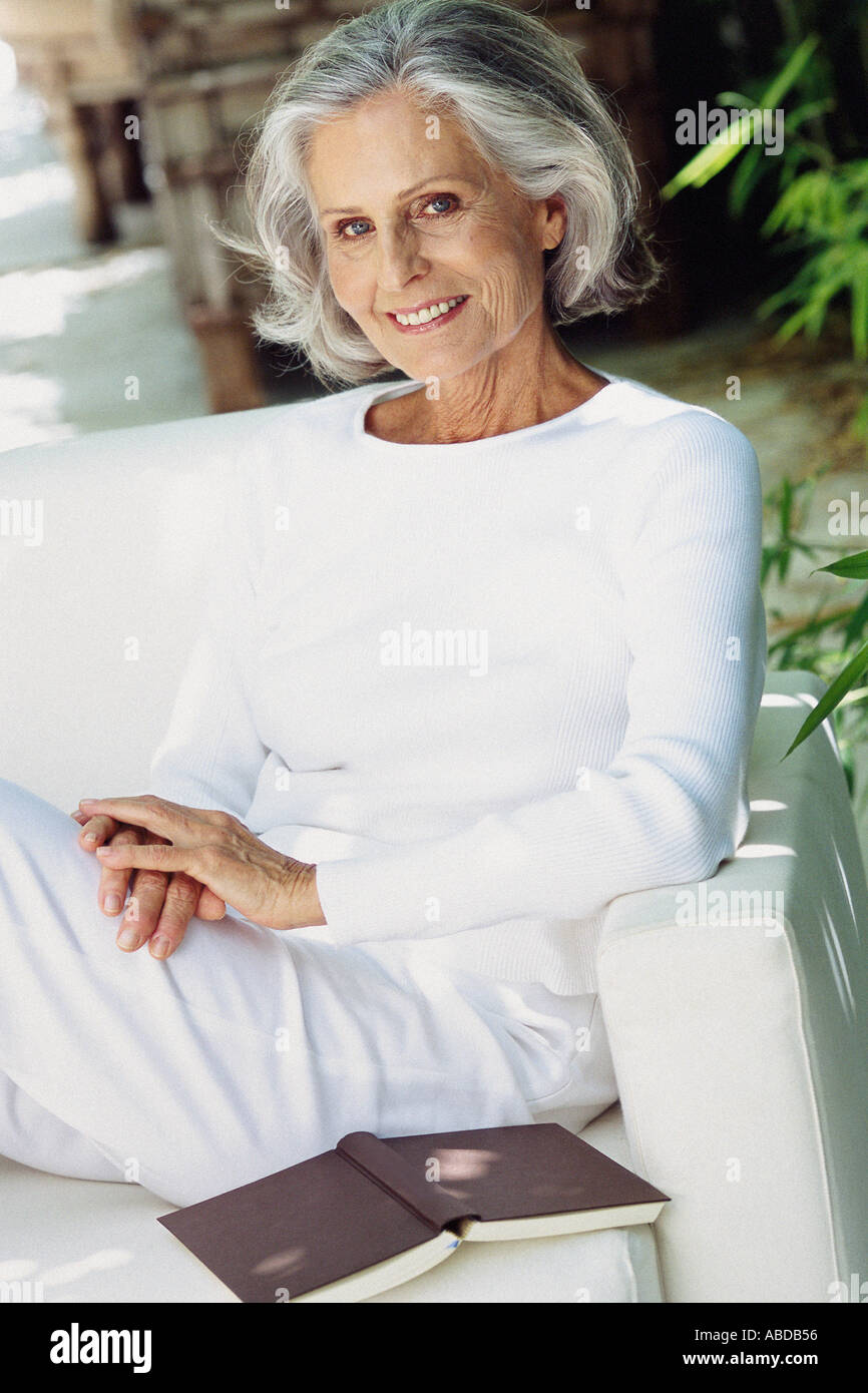 Ageing woman outdoors Stock Photo - Alamy