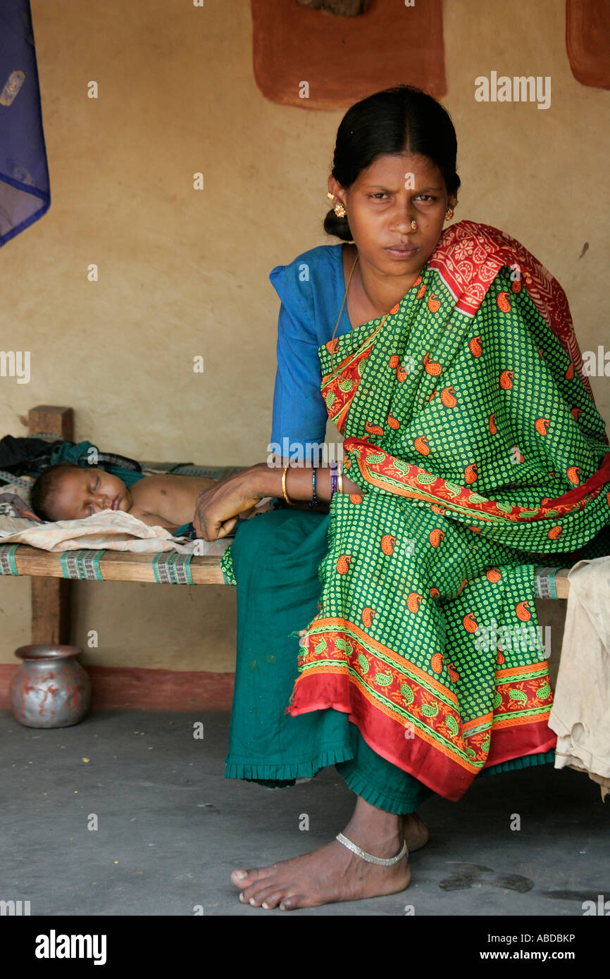 Saora woman and child at the village of Gaibambh near Taptapani, Orissa ...