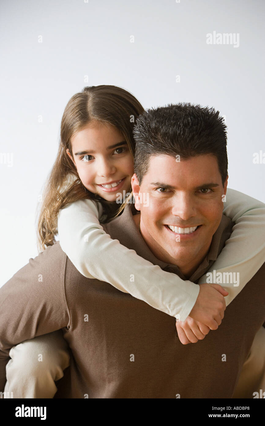 Father carrying daughter Stock Photo - Alamy