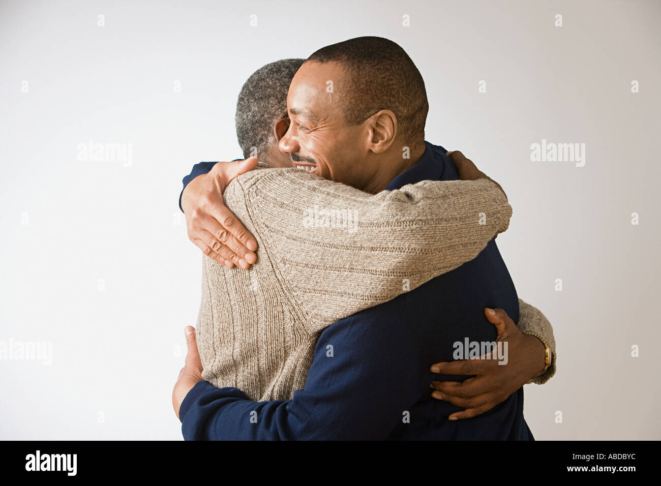 Father and son hugging Stock Photo - Alamy
