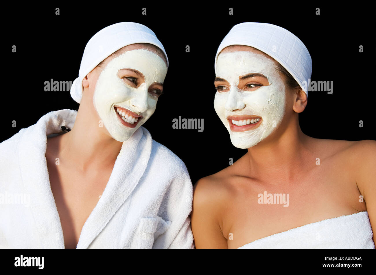 Two women wearing face masks Stock Photo - Alamy