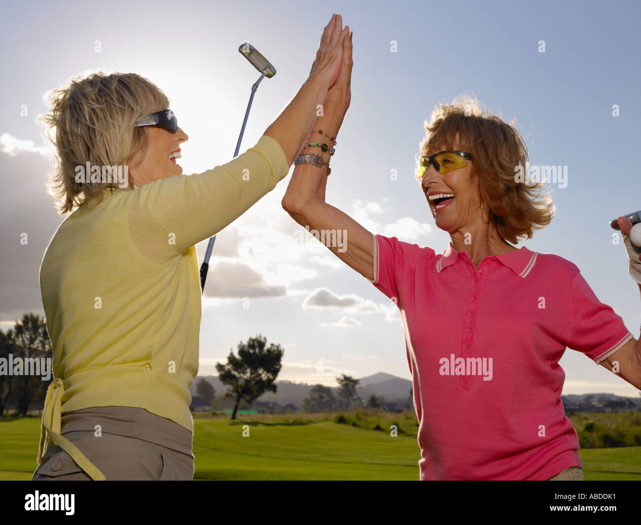 Golf team high five hi-res stock photography and images - Alamy