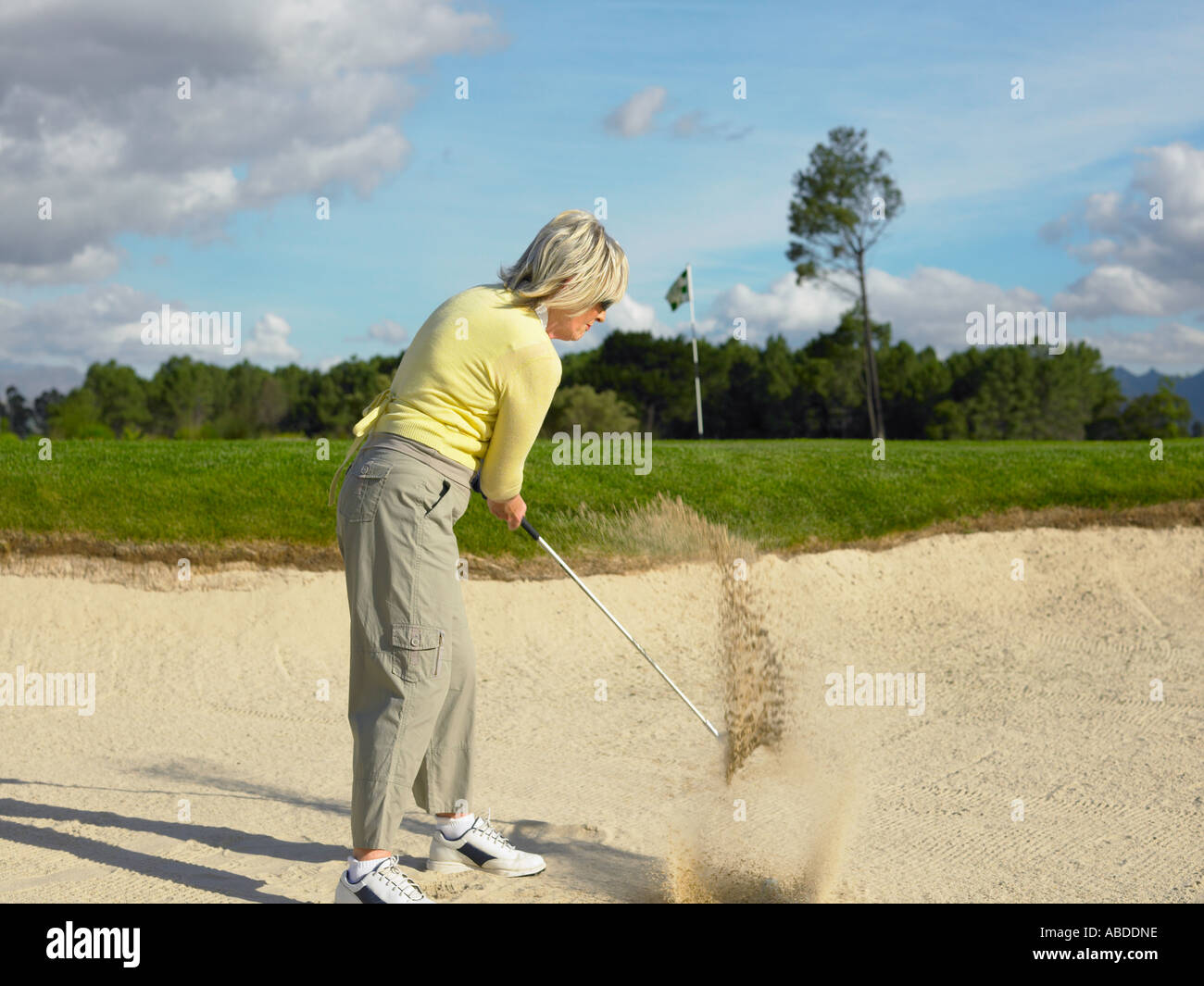 Woman golfer swing full length hi-res stock photography and images - Alamy