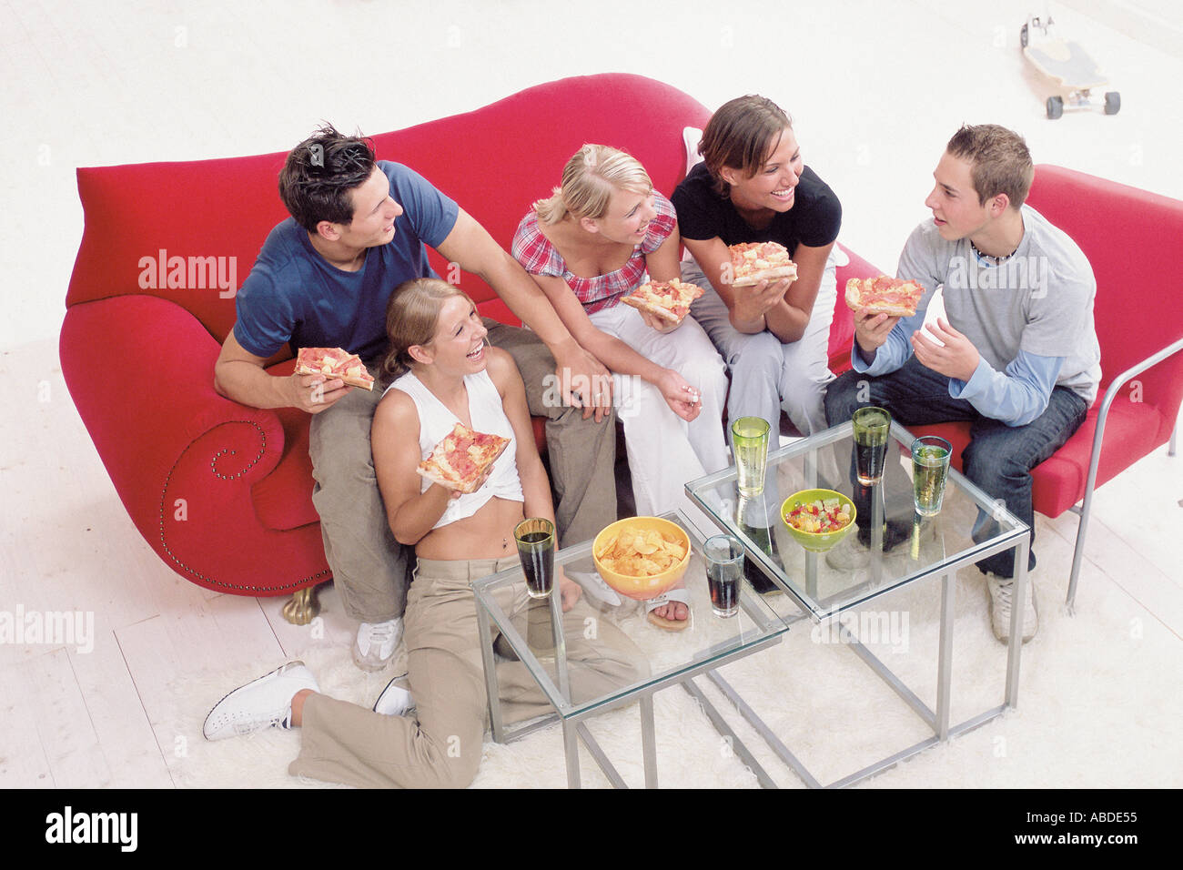 Friends at home Stock Photo - Alamy