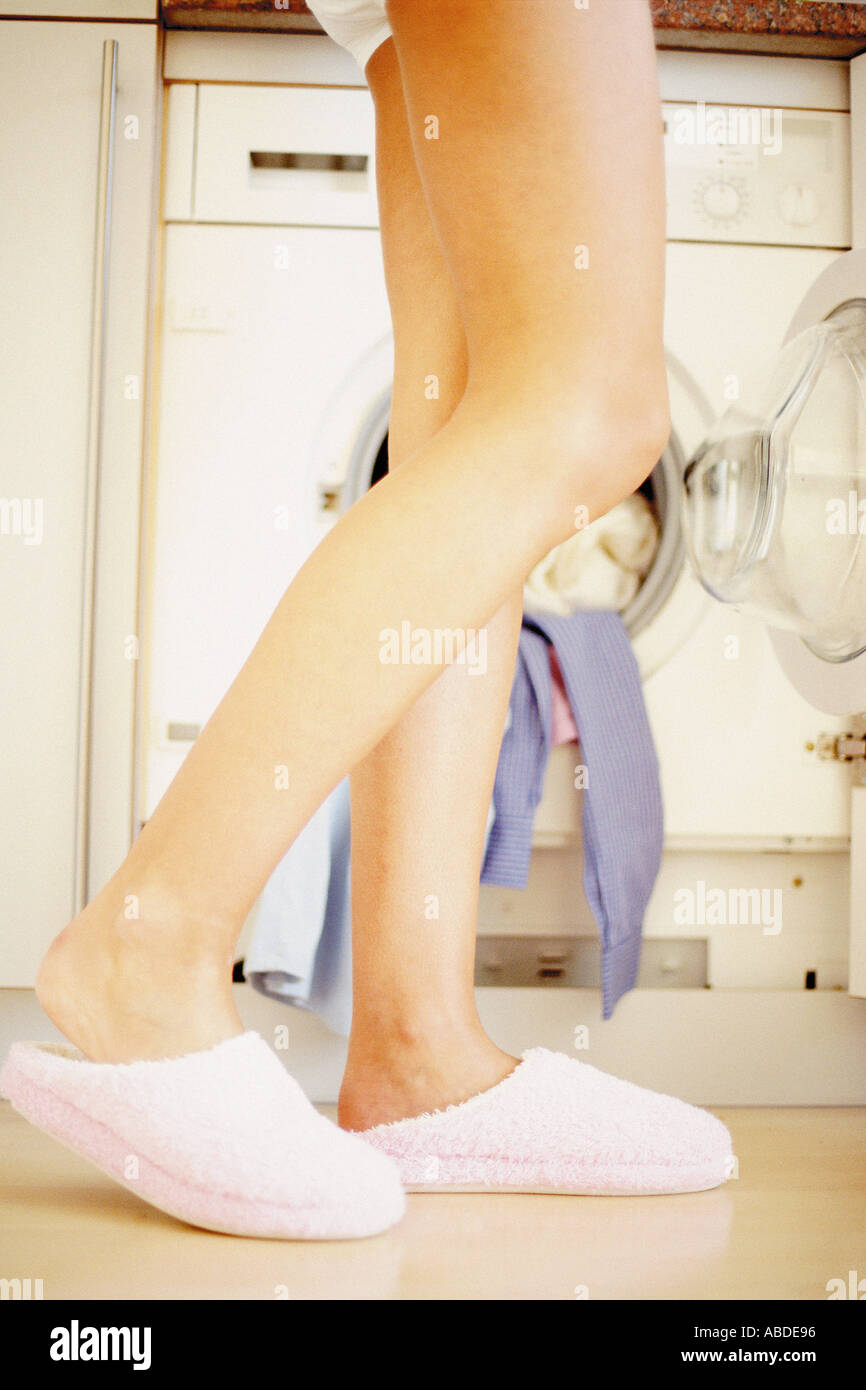 Young woman one leg washing hi-res stock photography and images - Alamy