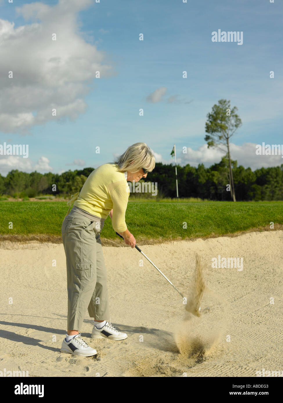 Older woman swinging hi-res stock photography and images - Alamy