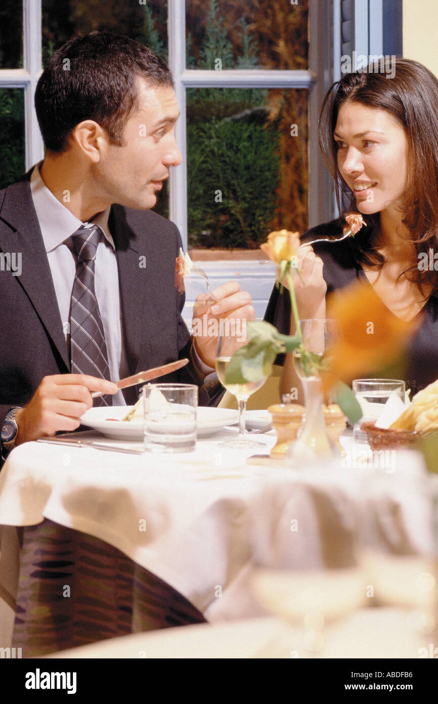 Couple eating out Stock Photo - Alamy