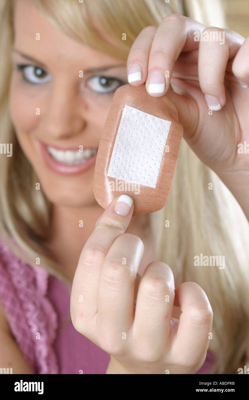 Woman with plaster Stock Photo - Alamy