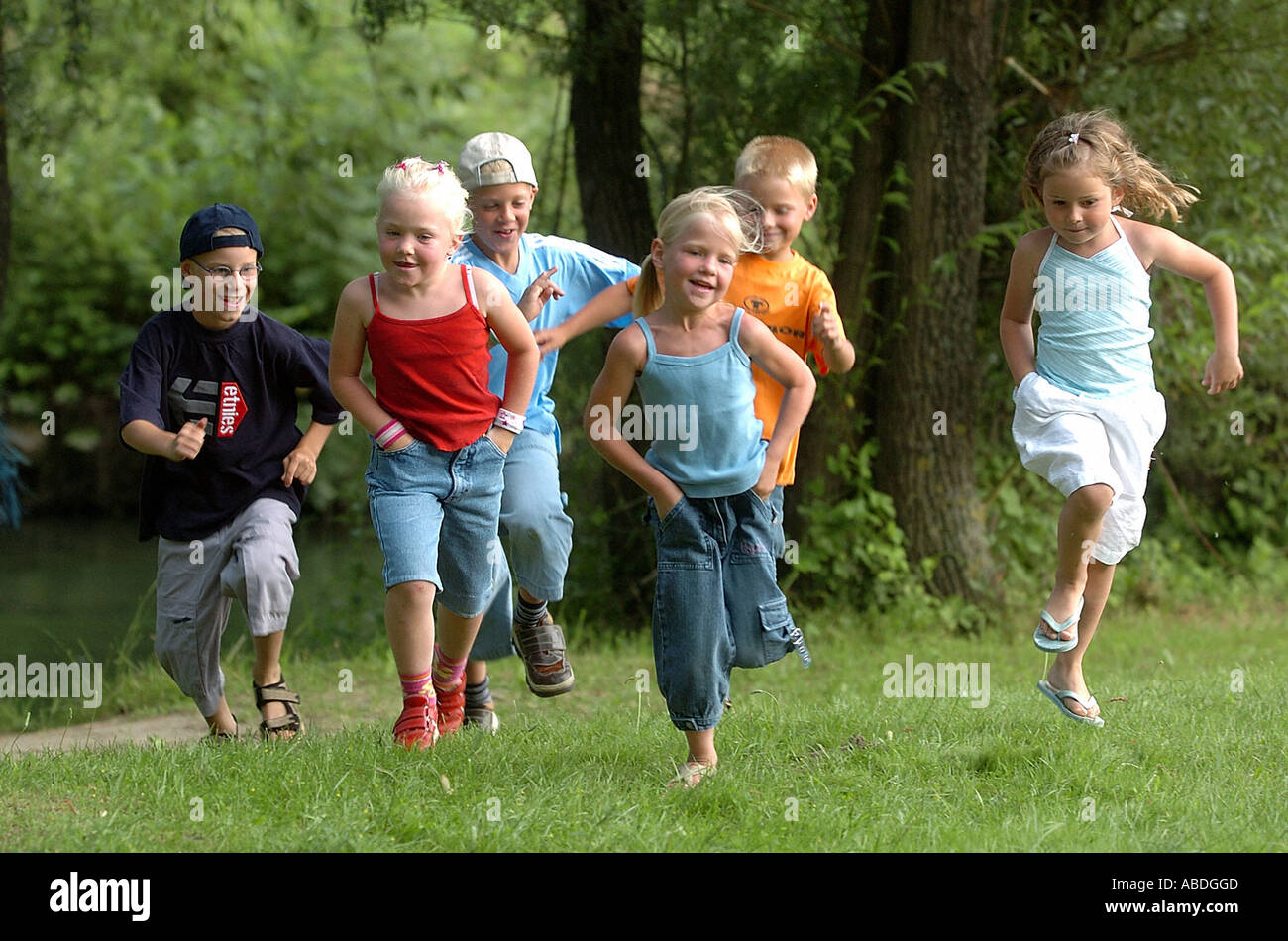 Girl running over meadow hi-res stock photography and images - Alamy