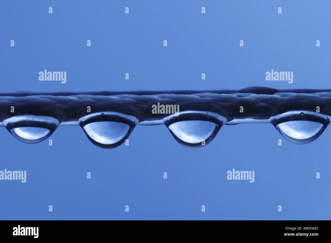 Water drop on a clothes line Stock Photo - Alamy