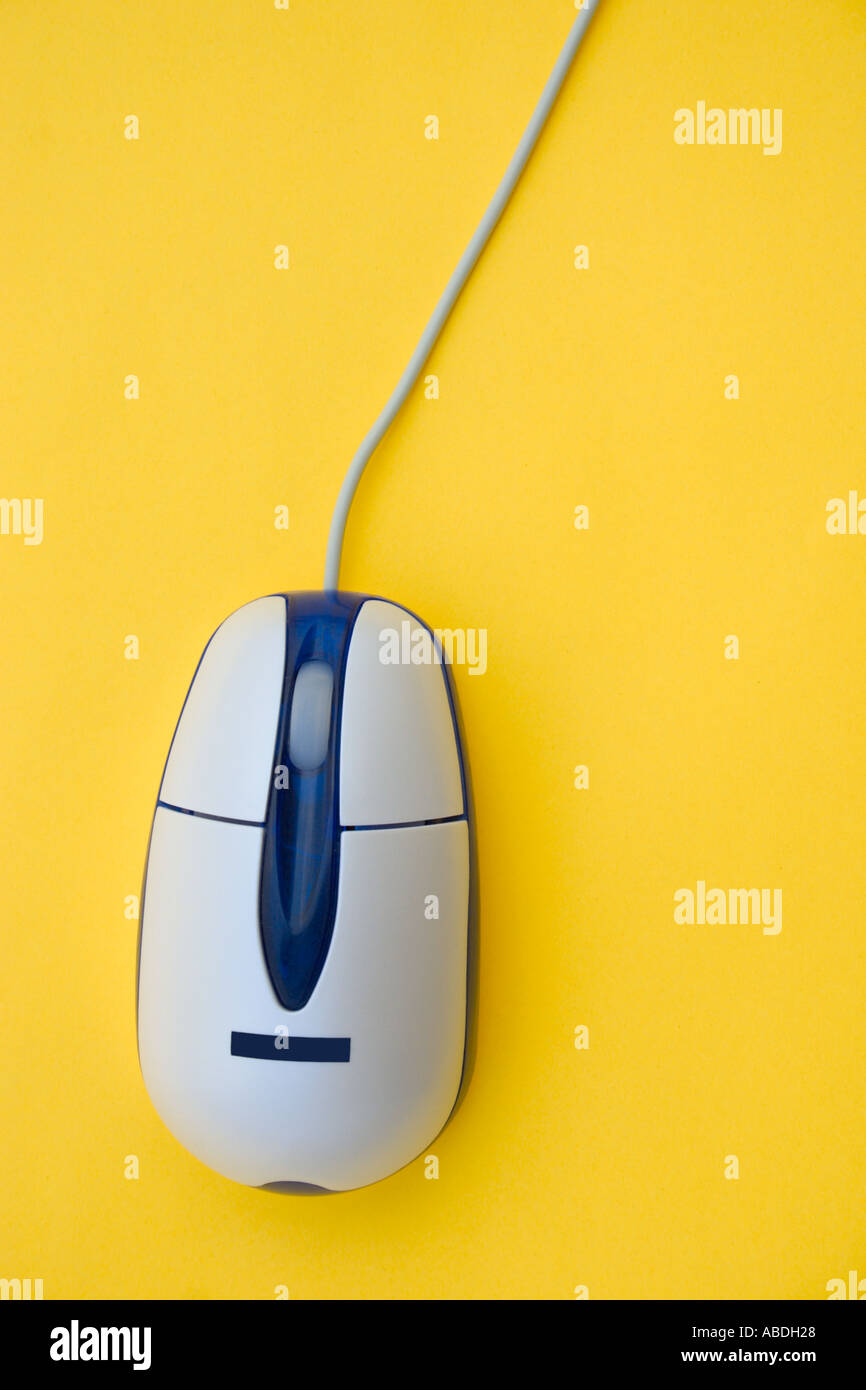 scroll mouse on yellow background isolated top view Stock Photo - Alamy