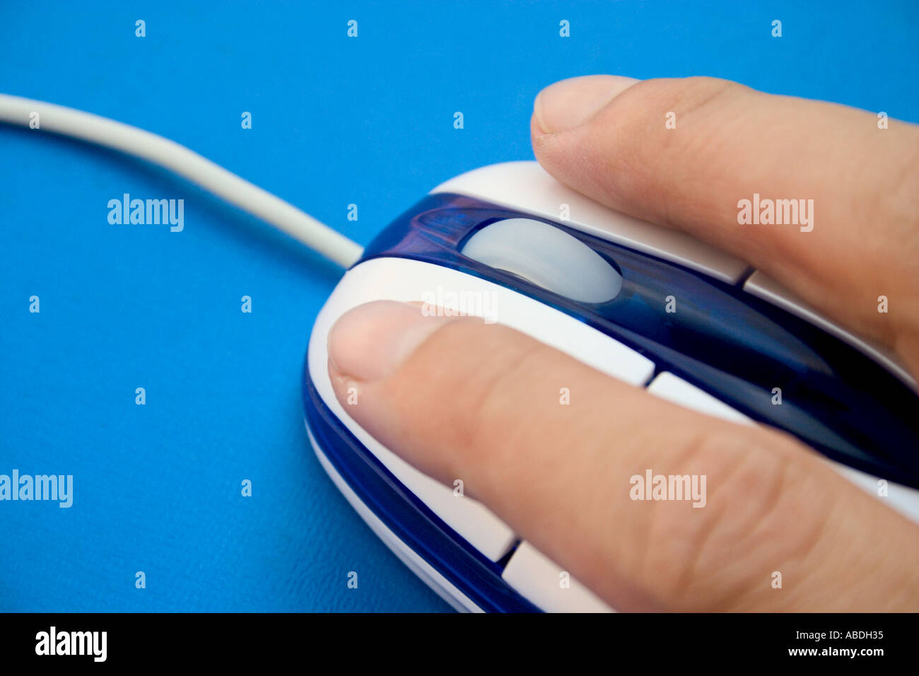 two fingers on scroll mouse Stock Photo - Alamy