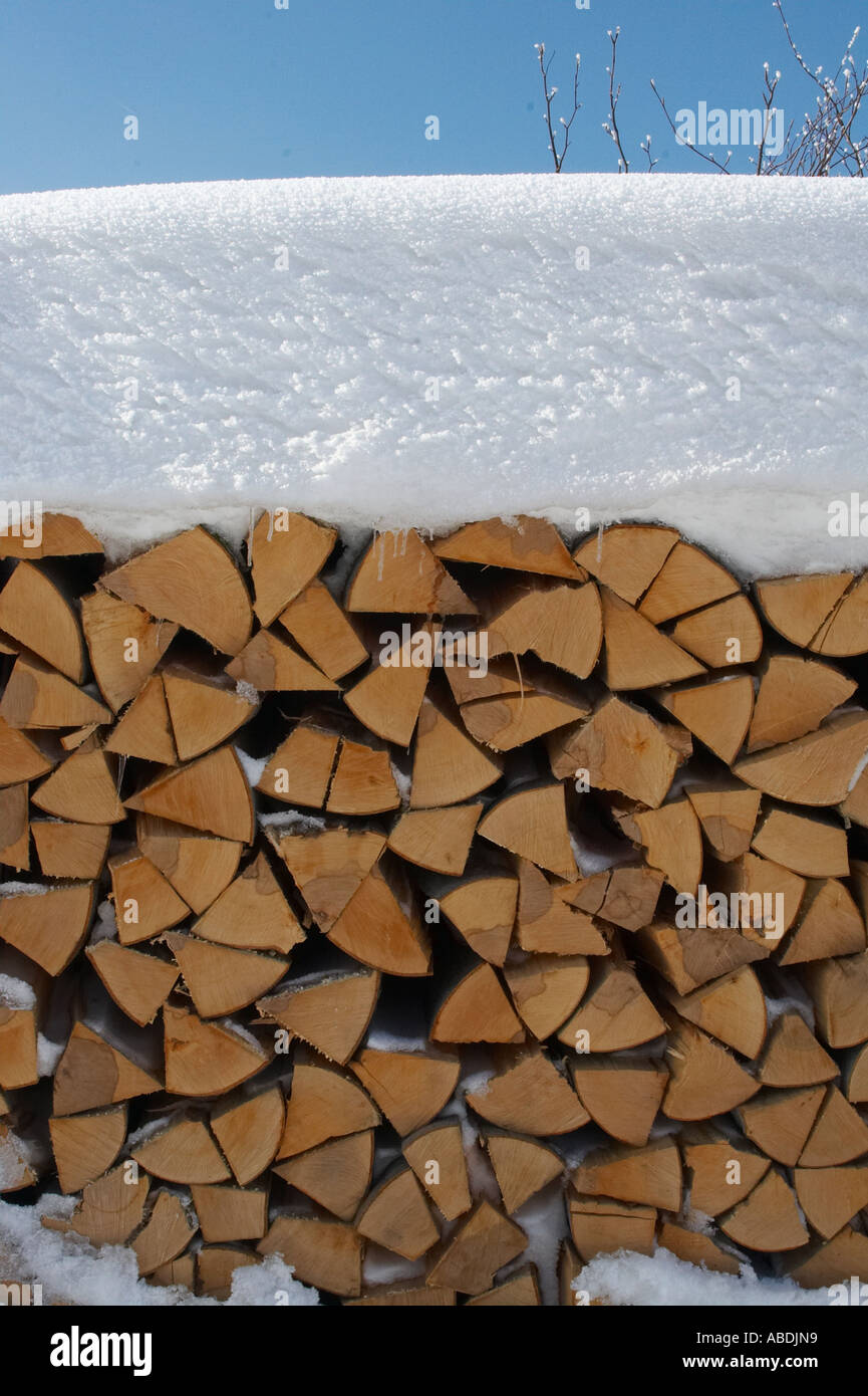 wood pile in with snow Stock Photo - Alamy