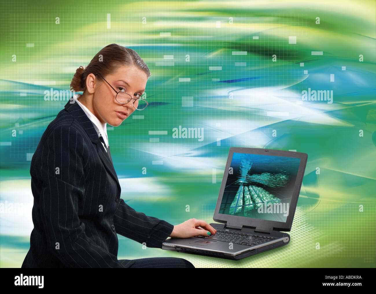 Woman with a laptop computer in a virtual world Stock Photo - Alamy