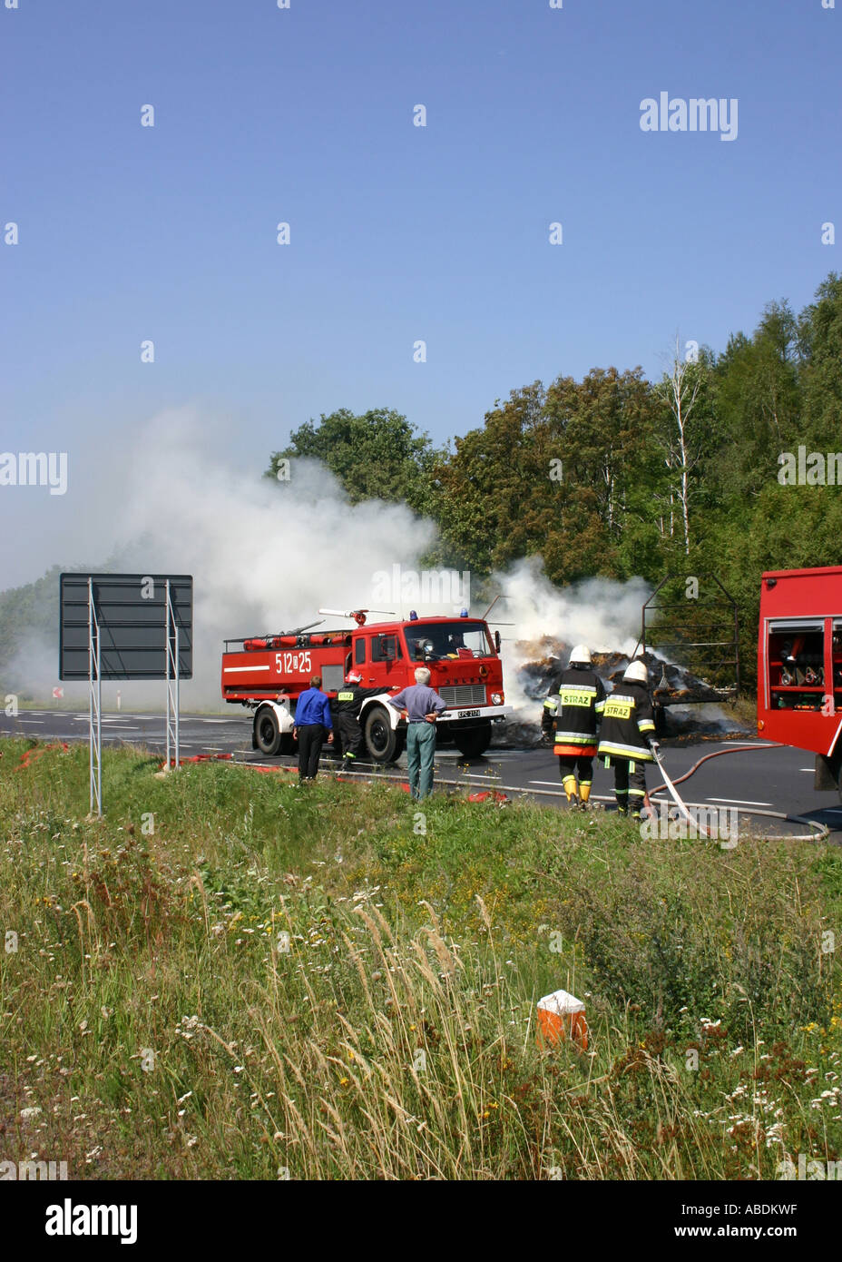 fireman in action Stock Photo - Alamy