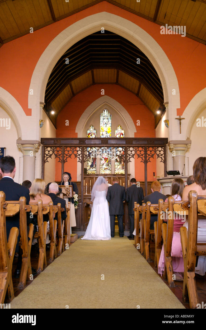 Family inside church, pew hi-res stock photography and images - Alamy