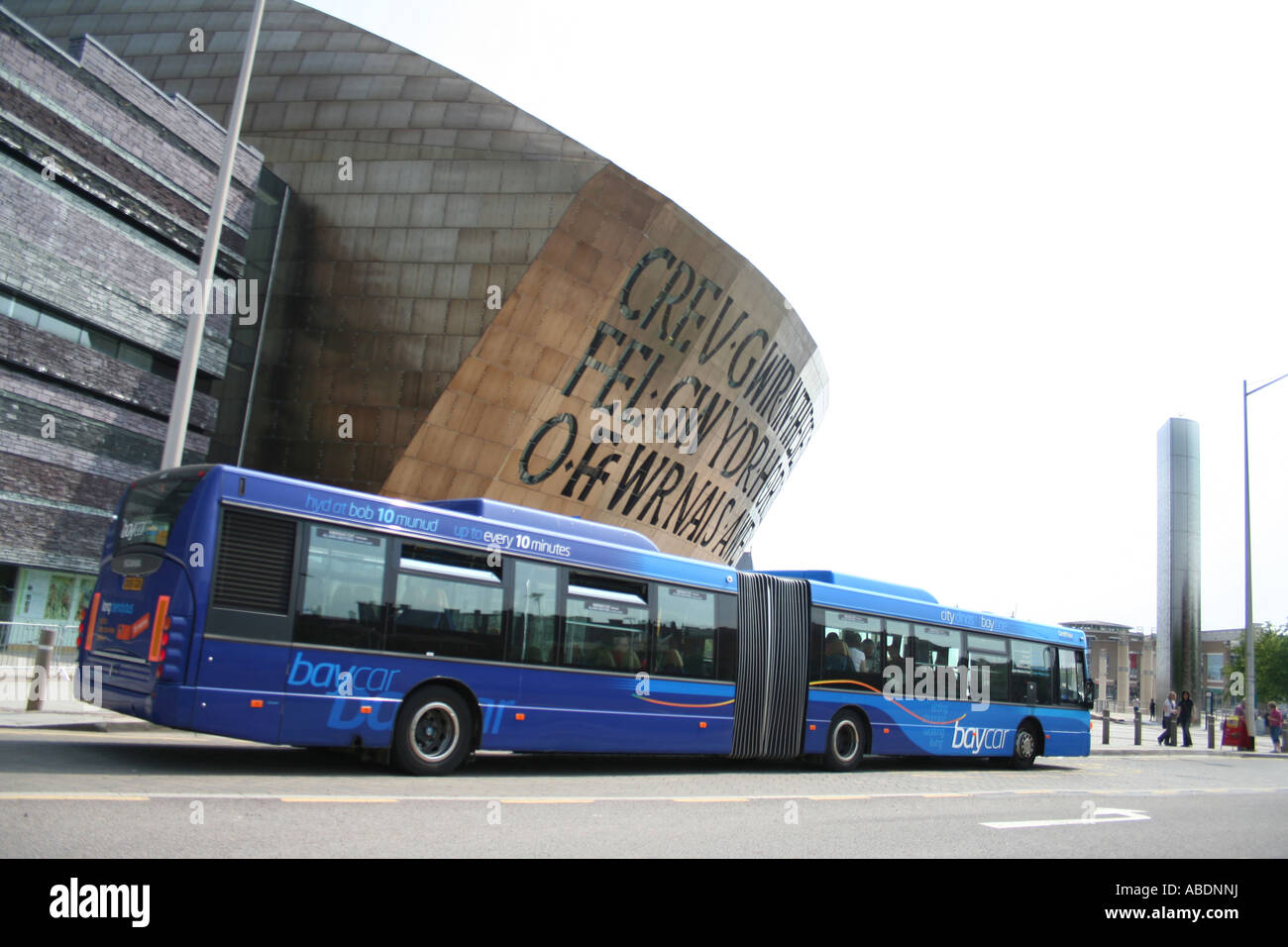 Bendy Bus Wales Millennium Centre Cardiff Bay Stock Photo - Alamy