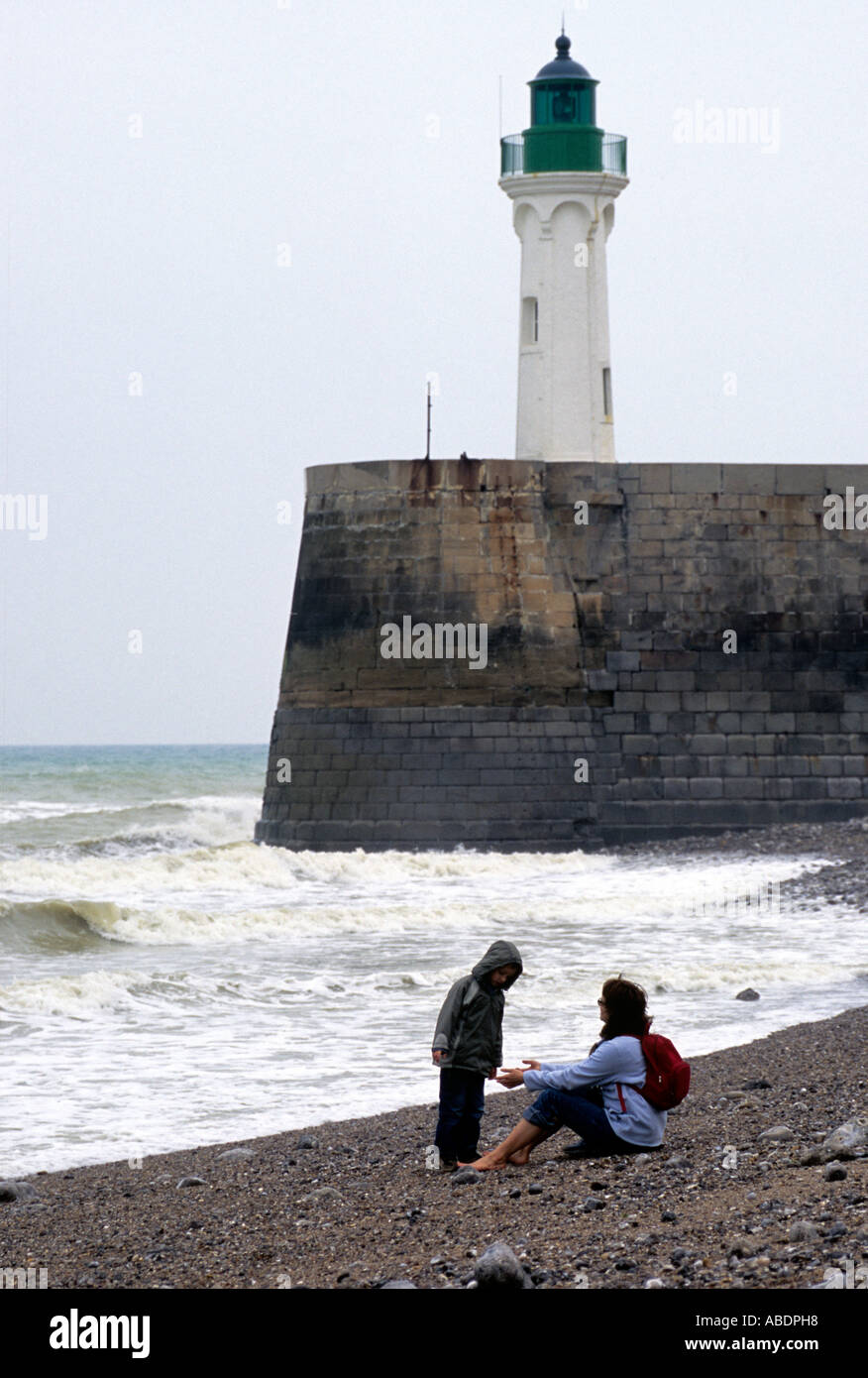 Normandy lighthouse mother and son on sea hi-res stock photography and ...