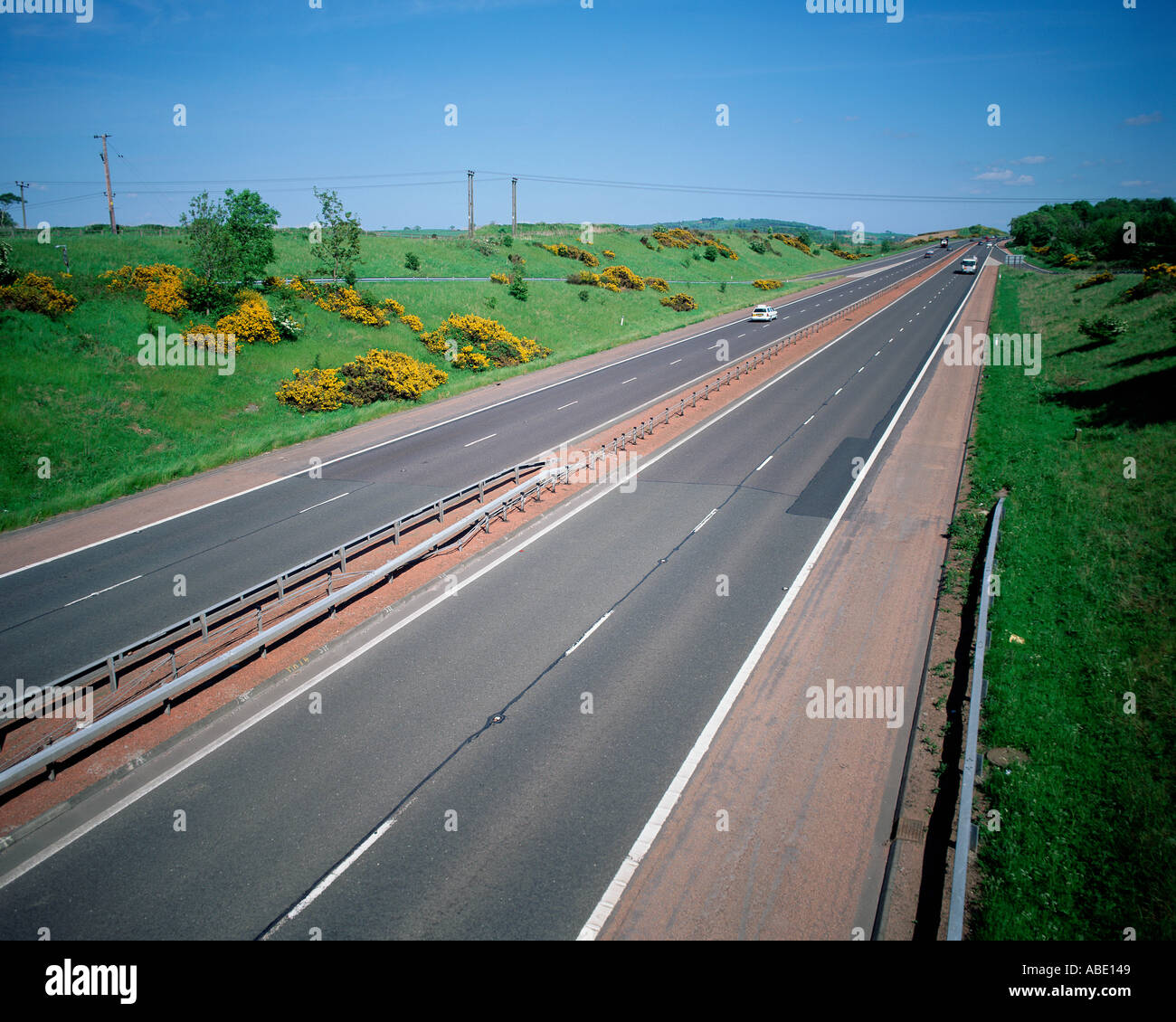 Road through countryside Stock Photo - Alamy