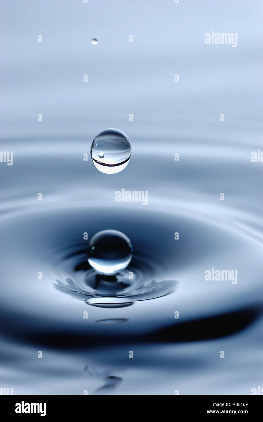Water droplet and ripples Stock Photo - Alamy