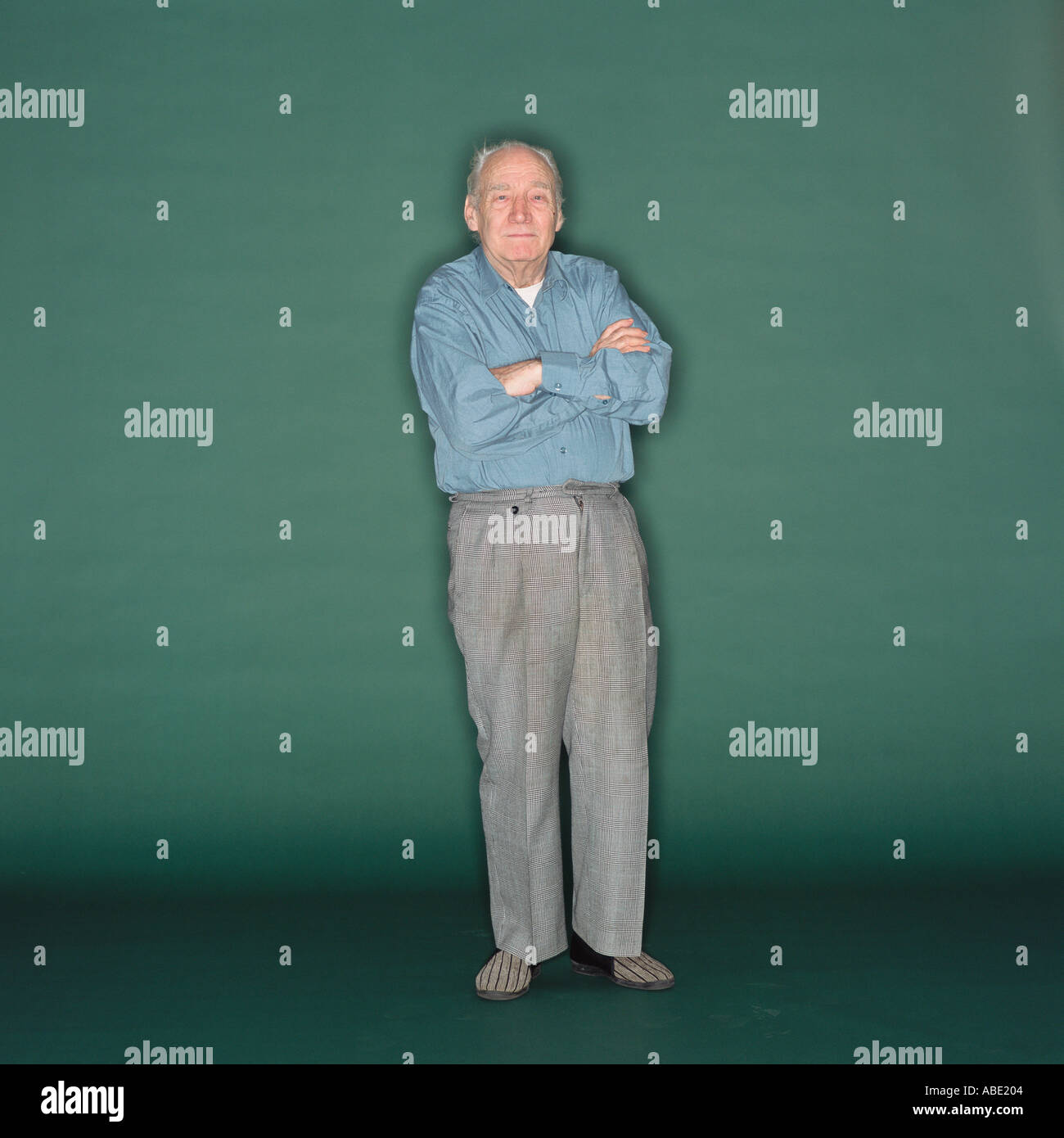 Grandad standing up in his slippers Stock Photo - Alamy