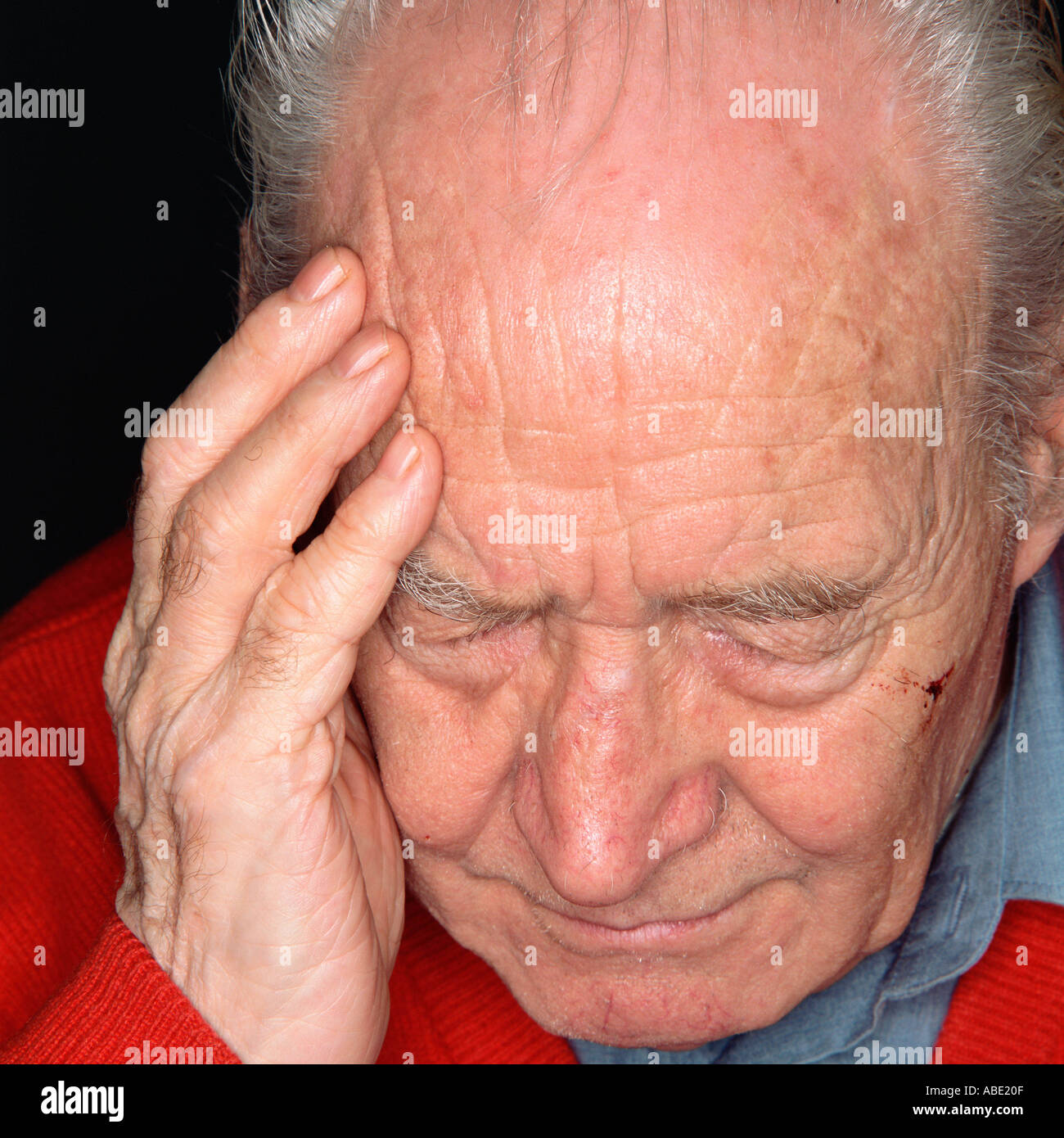 Elderly man with a small cut on his face Stock Photo - Alamy