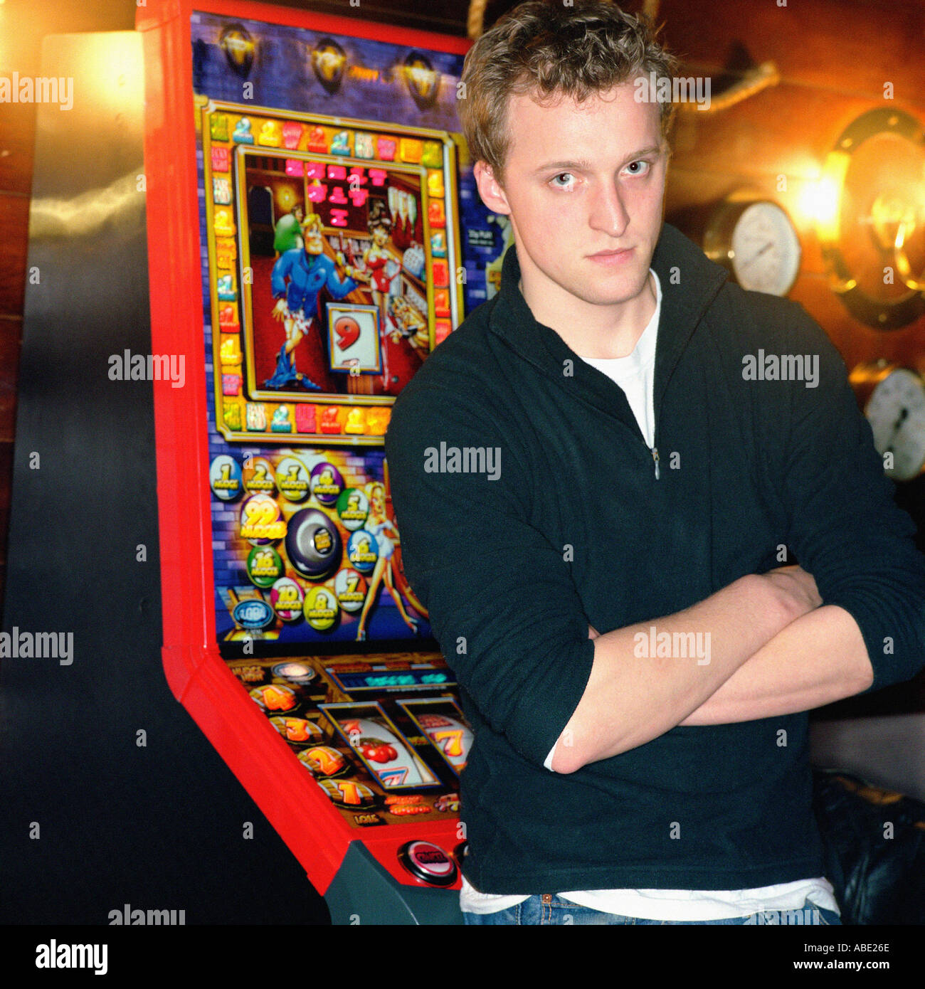 Teenager game machine hi-res stock photography and images - Alamy