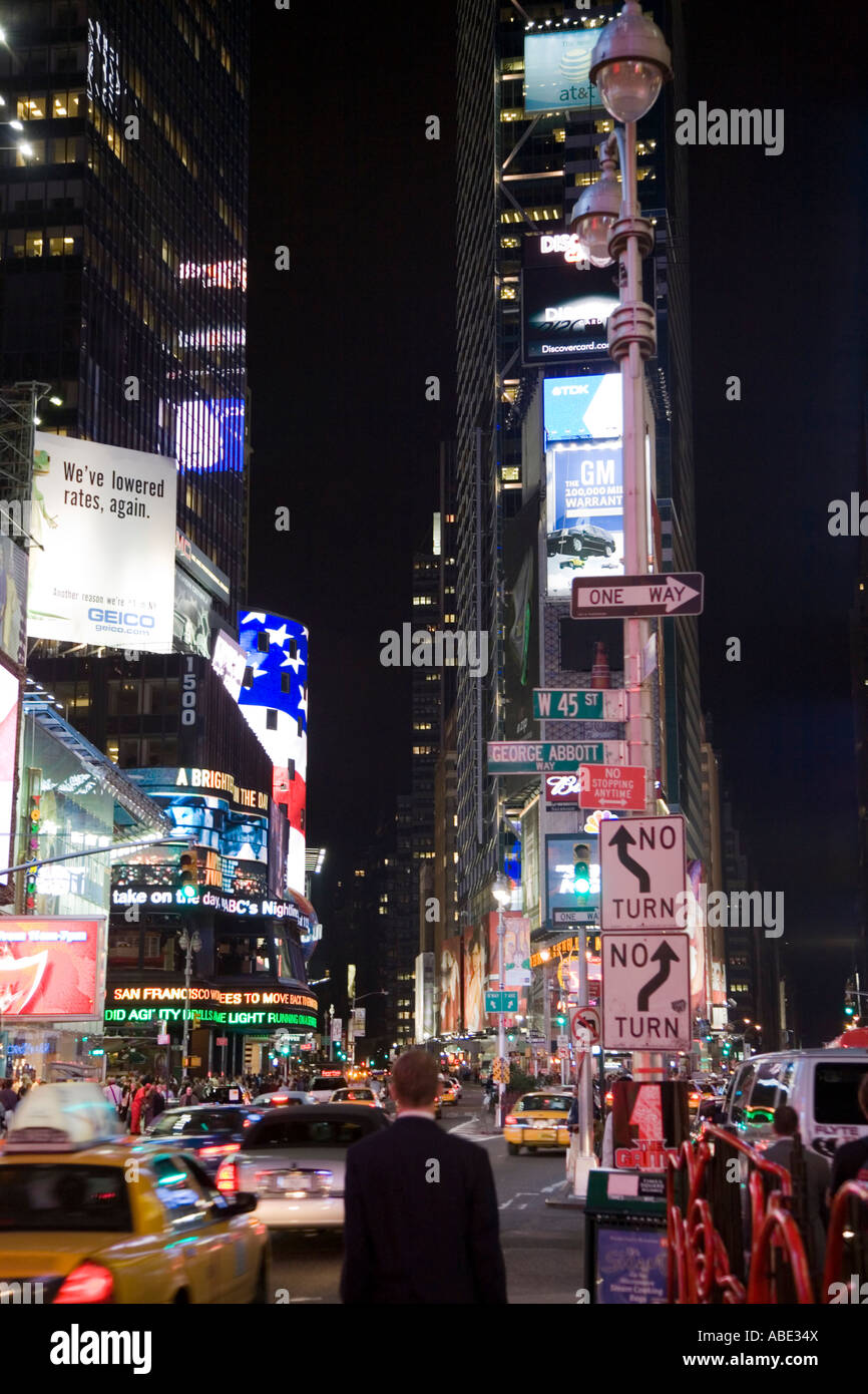 Times Square at Night Vertical Stock Photo - Alamy