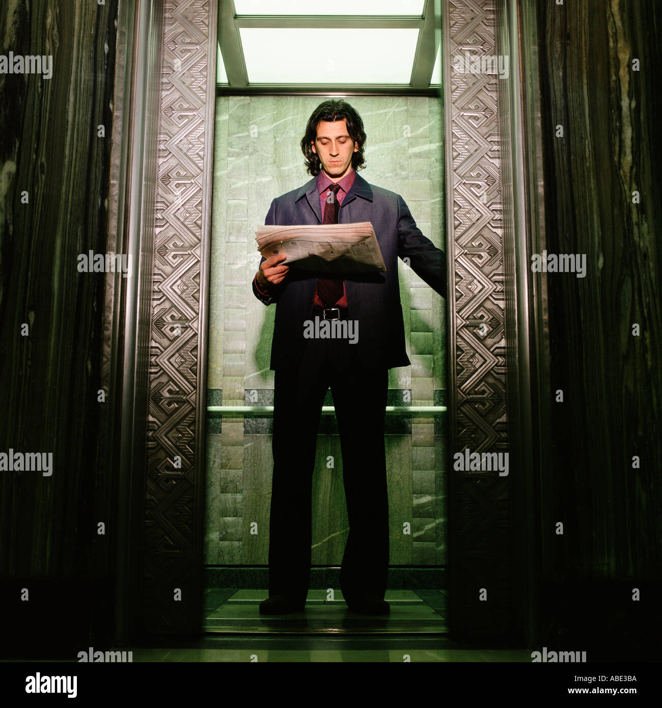 Man stand in an elevator hi-res stock photography and images - Alamy