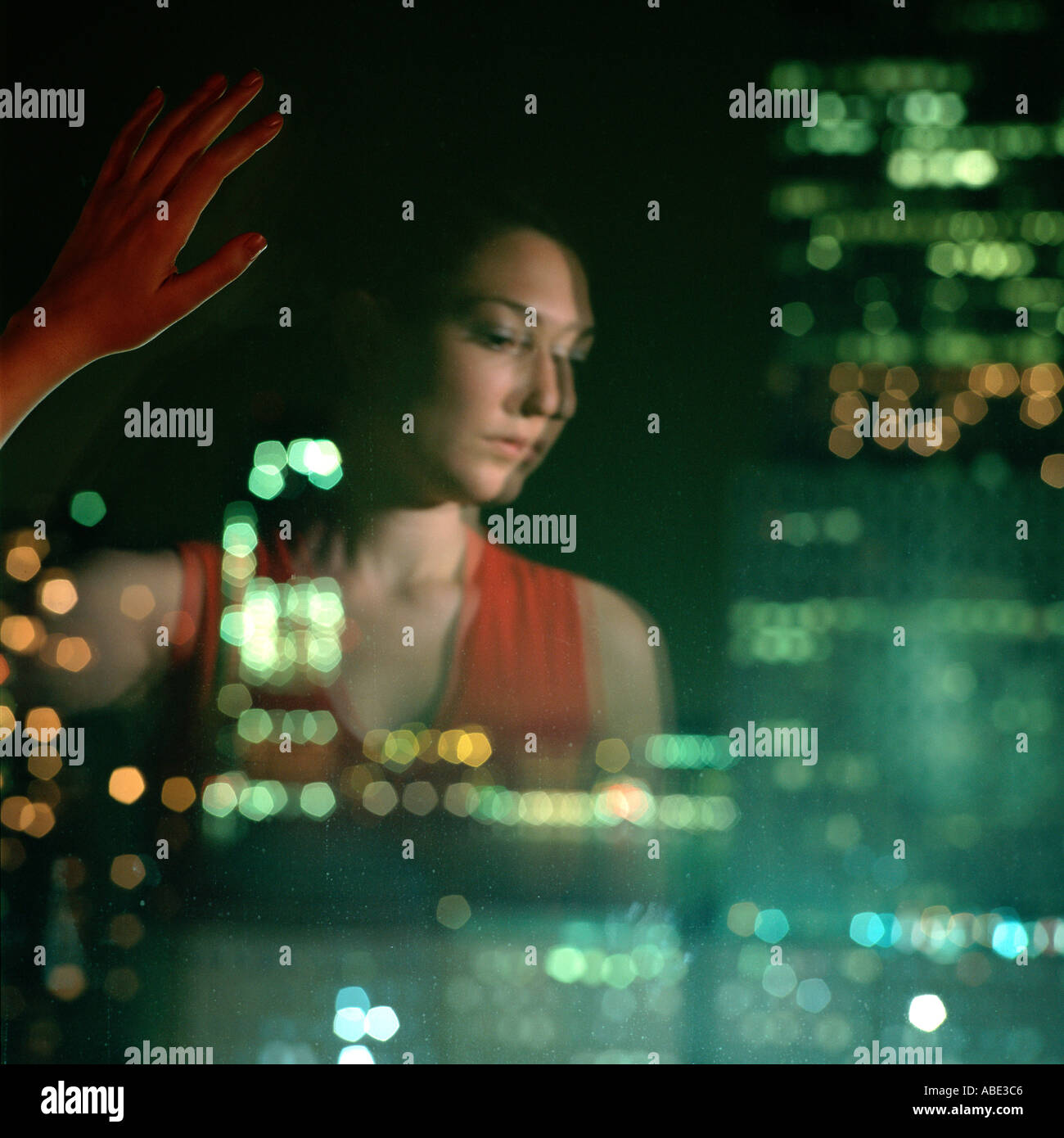 One person reflected in building window hi-res stock photography and ...