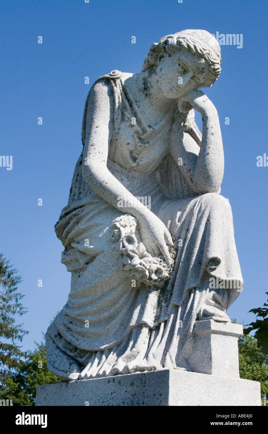 Woman thinking gravestone at the Hope Cemetery in Barre Vermont the ...