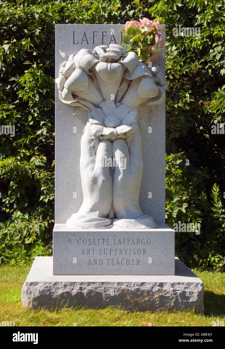 Hands holding flowers gravestone at the Hope Cemetery in Barre Vermont ...