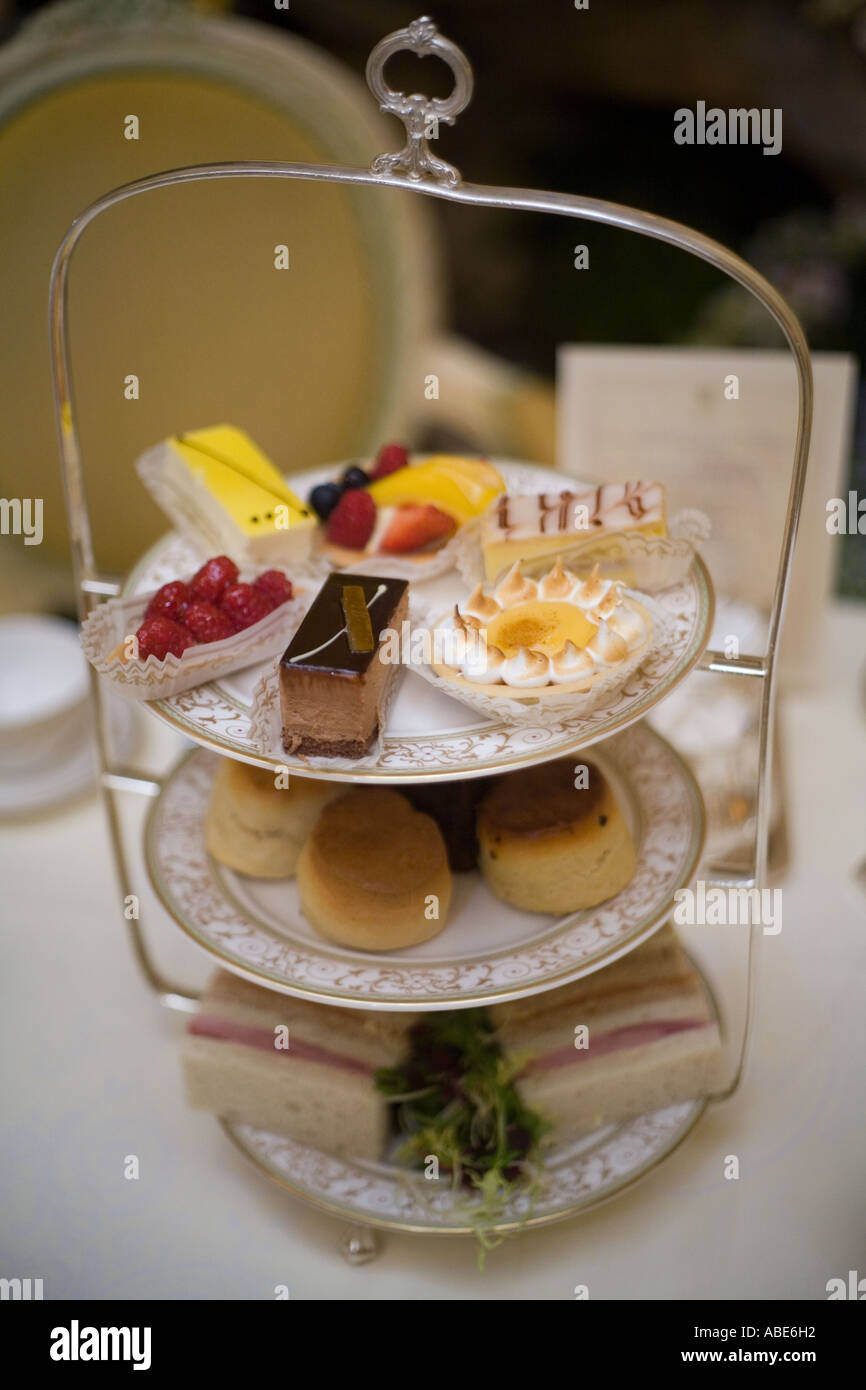 A basket of cakes and sandwiches served as High Tea at the Palm Court ...