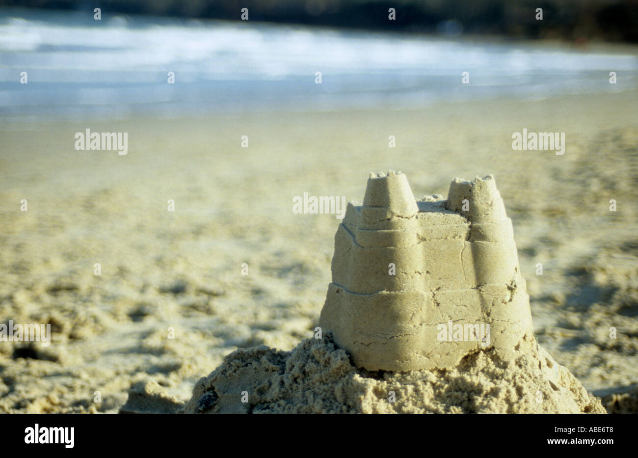 Old sand castle abandoned on sandy beach Stock Photo - Alamy