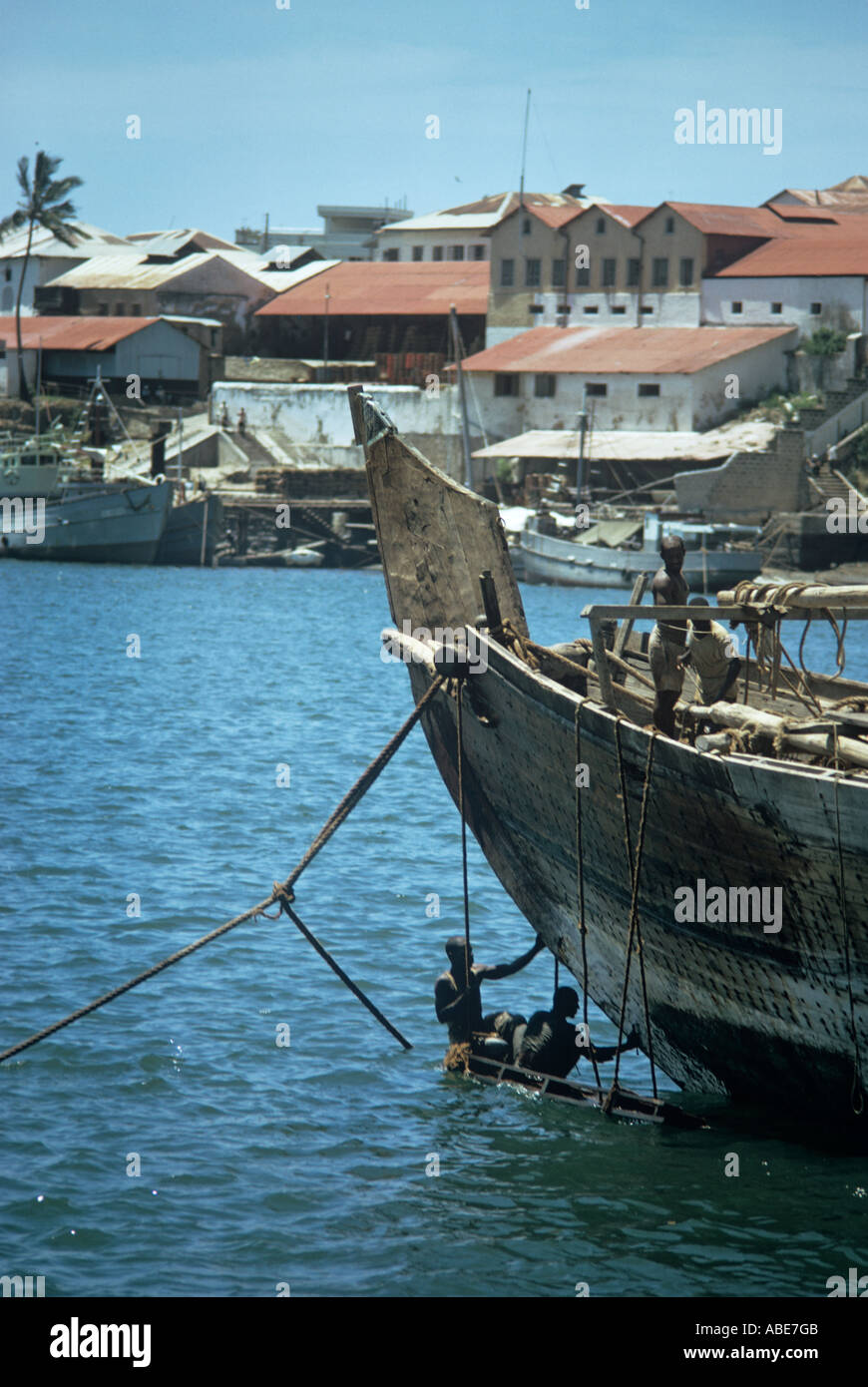 In Mombasa's Old Port a Somali sambuk, or dhow, gets a little ...