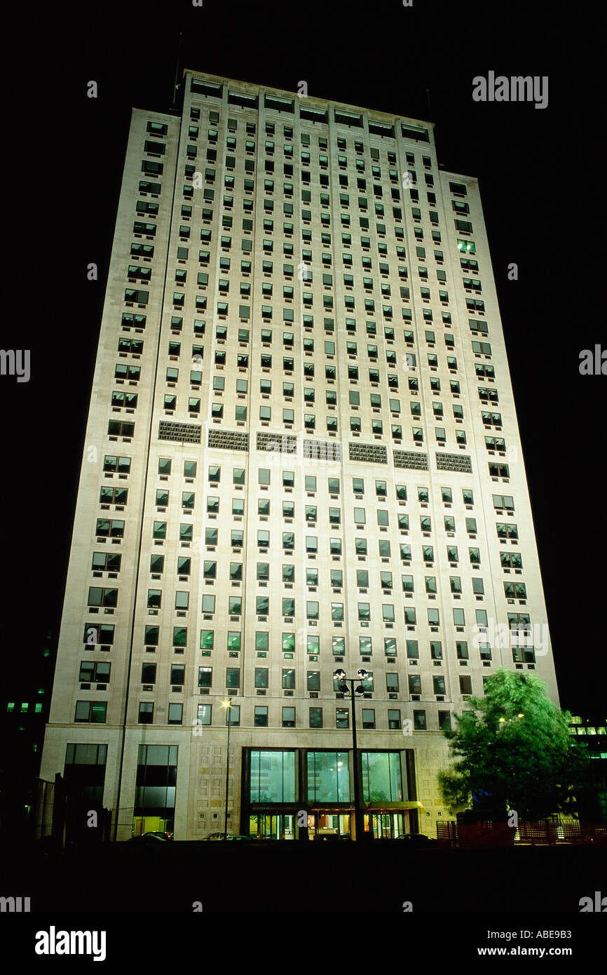 Multi-storied building at night Stock Photo - Alamy