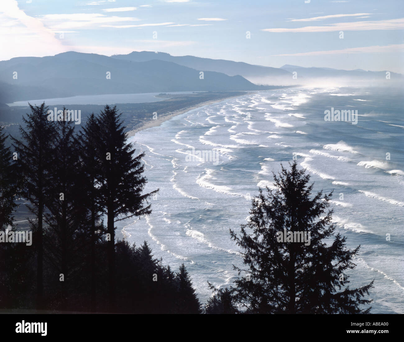 Crescent shaped shoreline washed by waves on the Northern Oregon coast ...