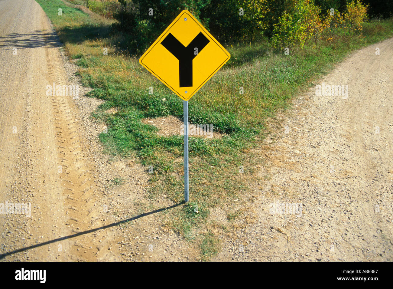 Road divides or splits sign Stock Photo - Alamy