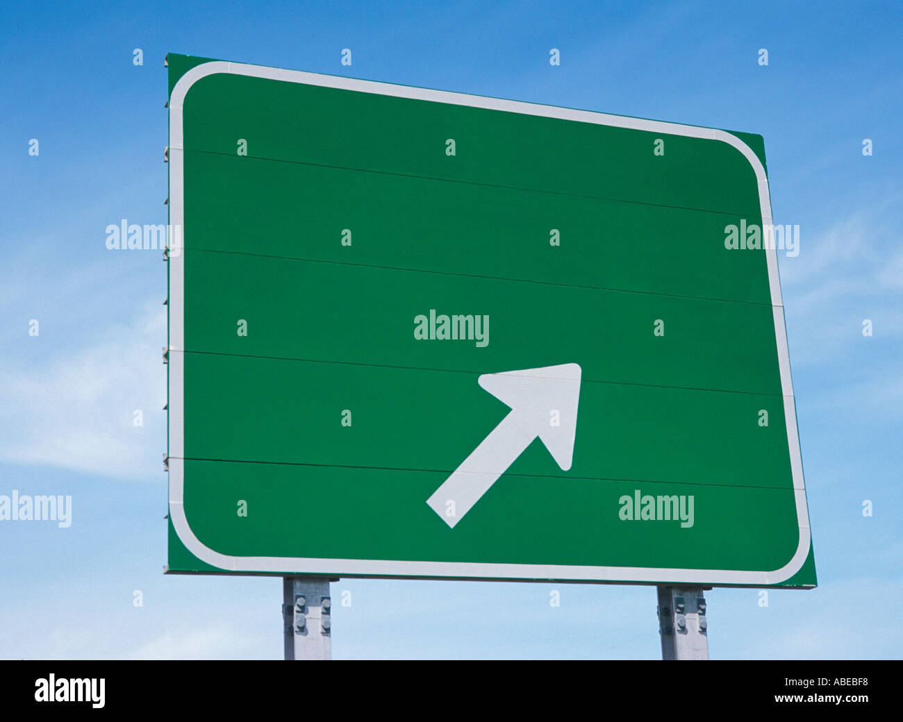 Directional sign with arrow pointing up and to the right and a blank ...
